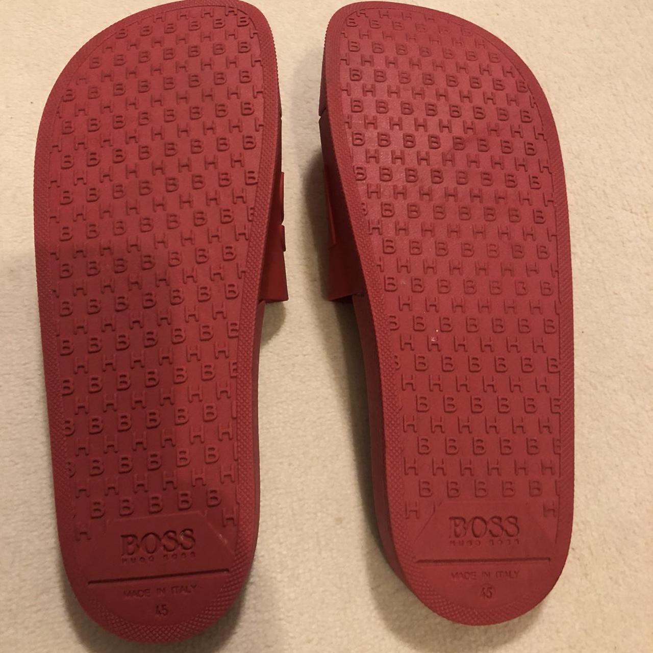 Boss mens red rubber sliders size 11. Worn once... - Depop