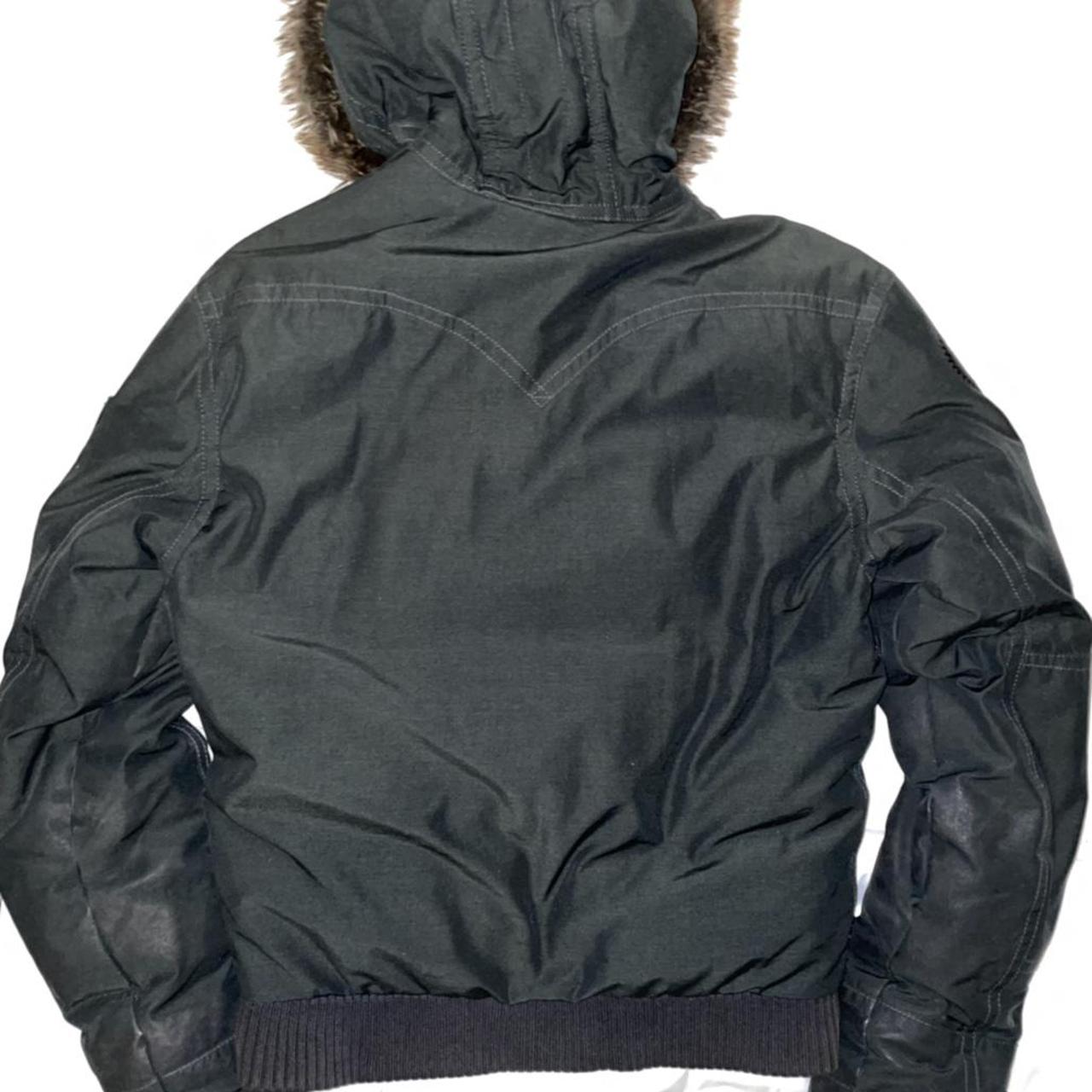 Levi’s winter jacket with fur on the hood... - Depop