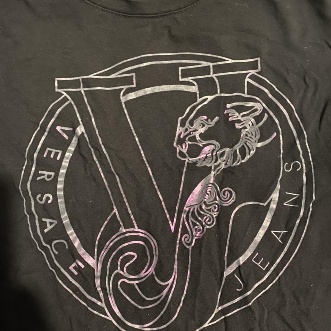 Versace jeans Tshirt. Has signs of wear as the logo... - Depop