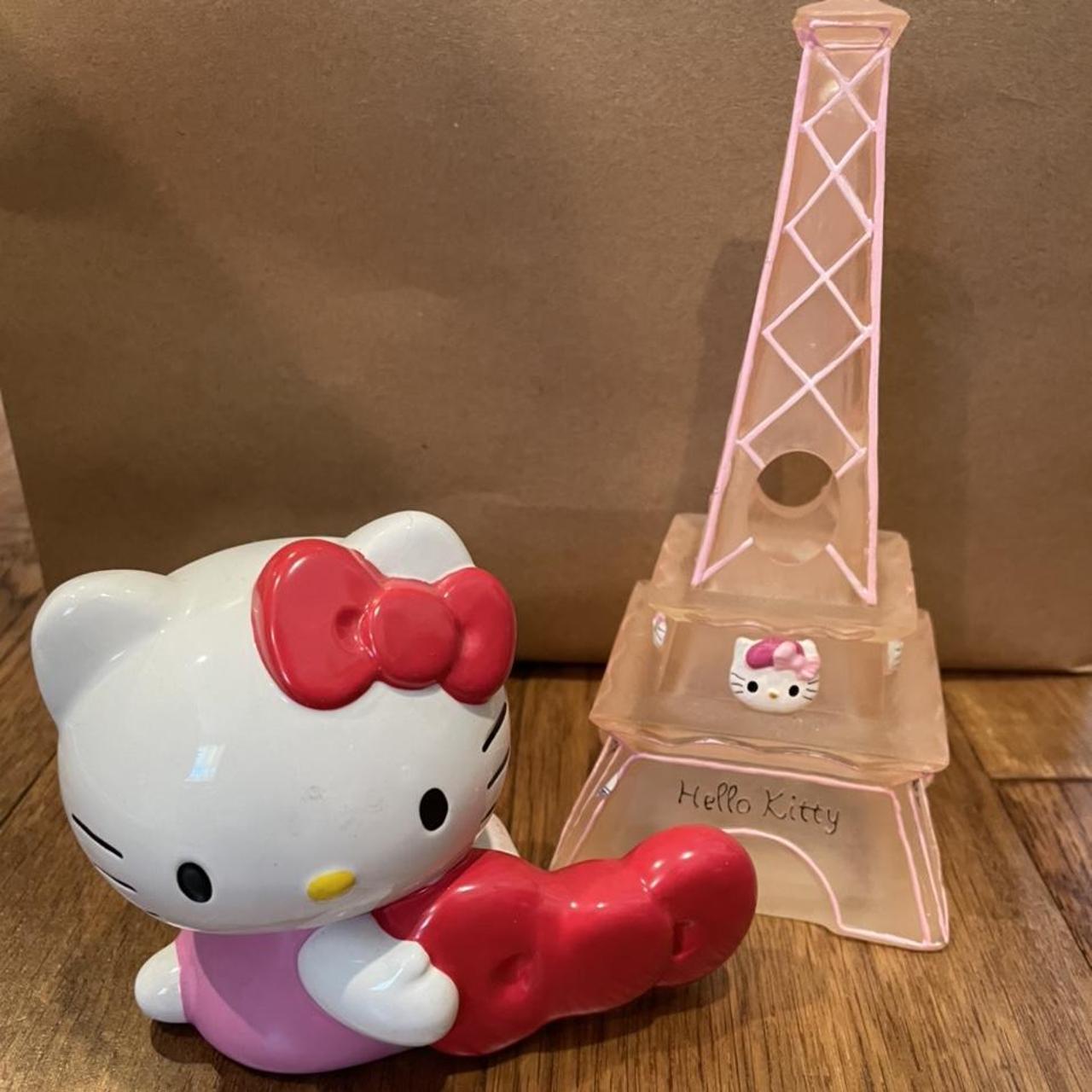 Hello Coin bank and 7.5” Hk Eiffel Tower... - Depop