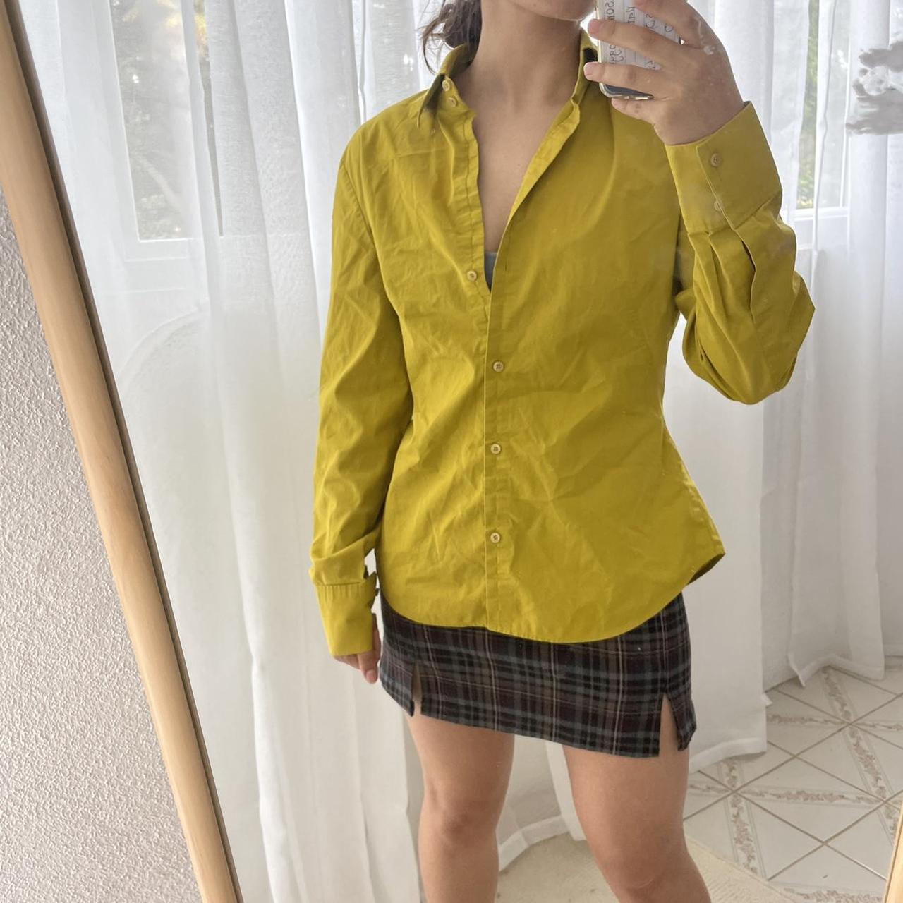 Cute yellow button up top from New York and company... - Depop