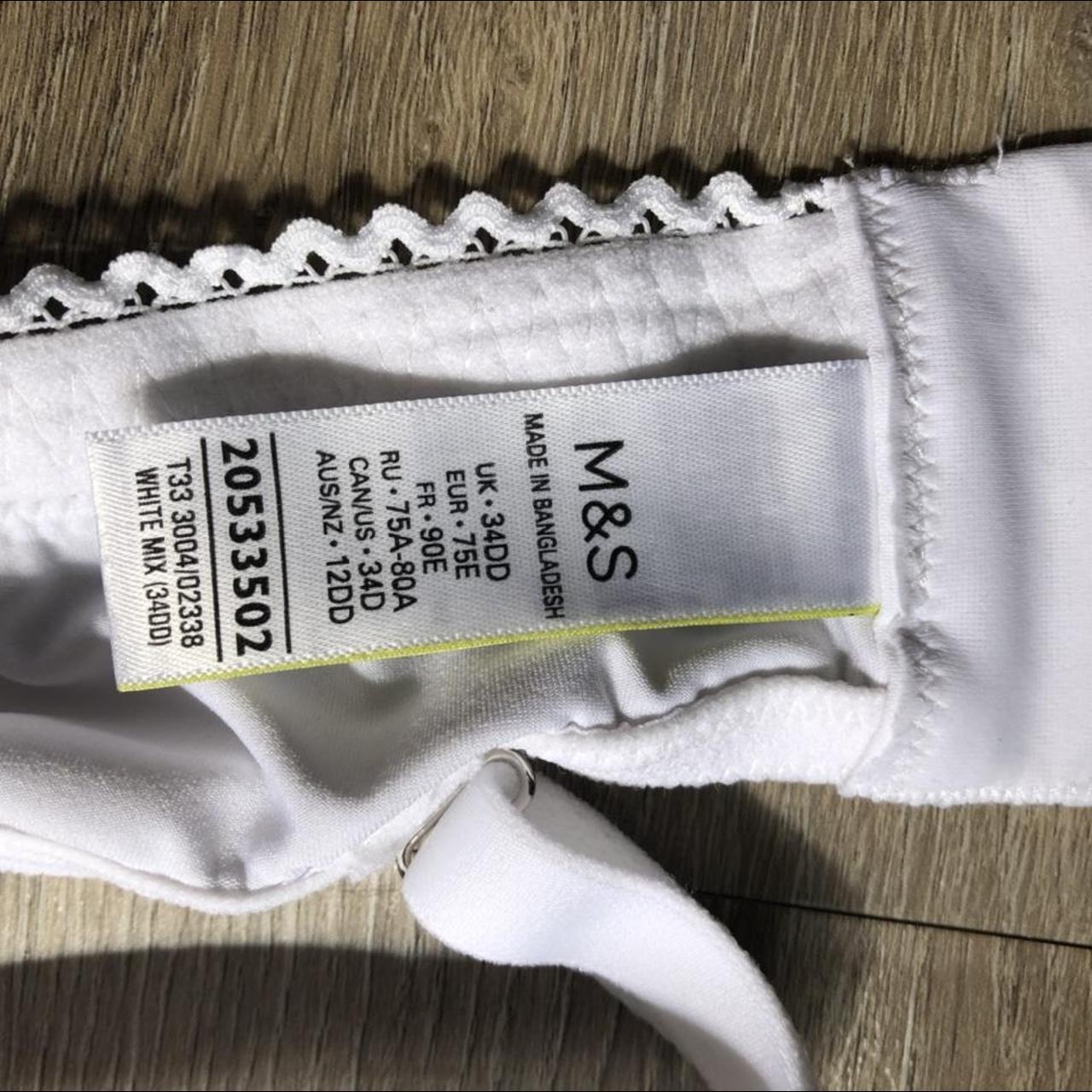 Really cute bra with golden laced pattern and white... - Depop