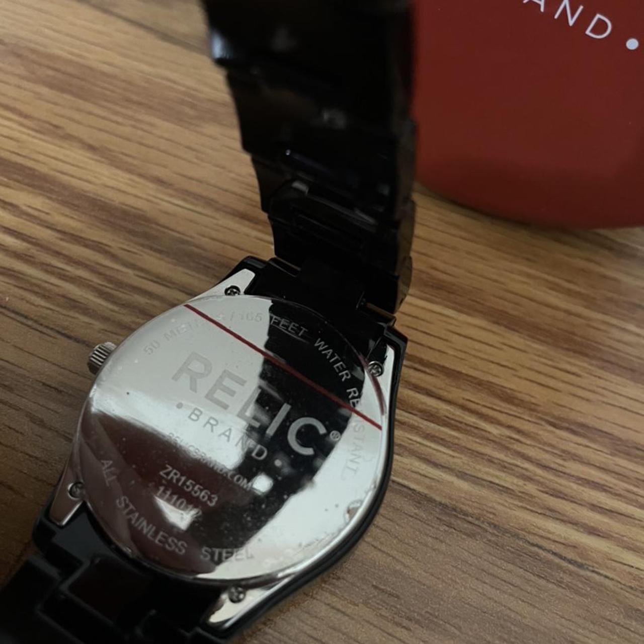 Relic black watch with rhinestones around the face.... - Depop