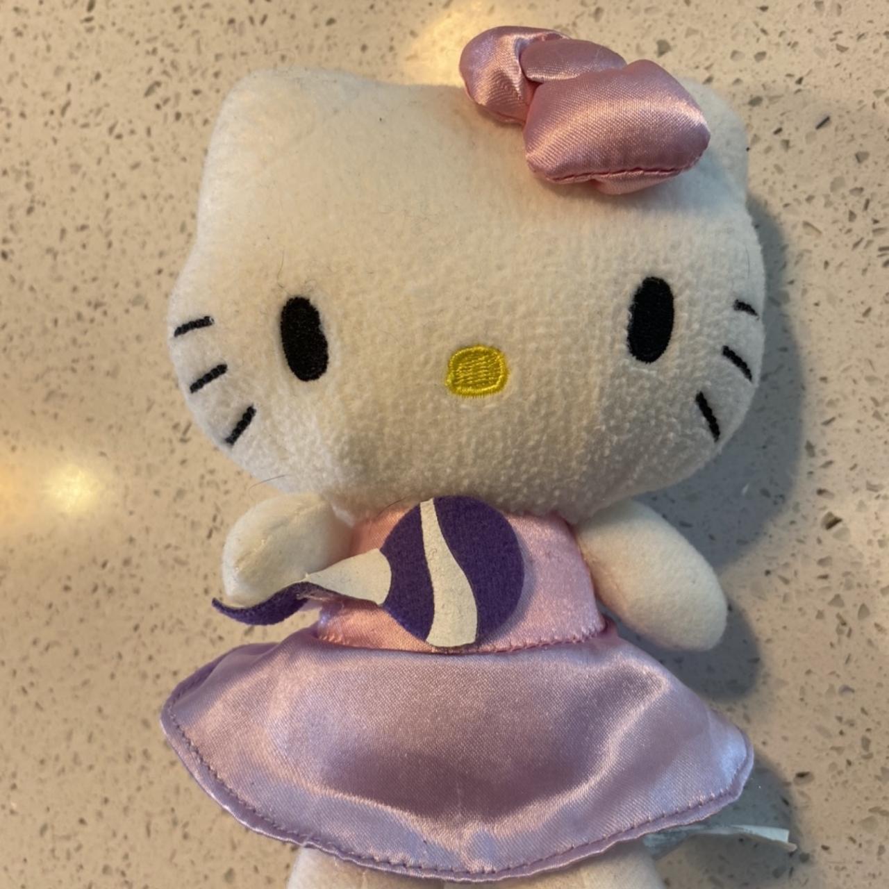 Singer Hello Kitty plush toy... - Depop