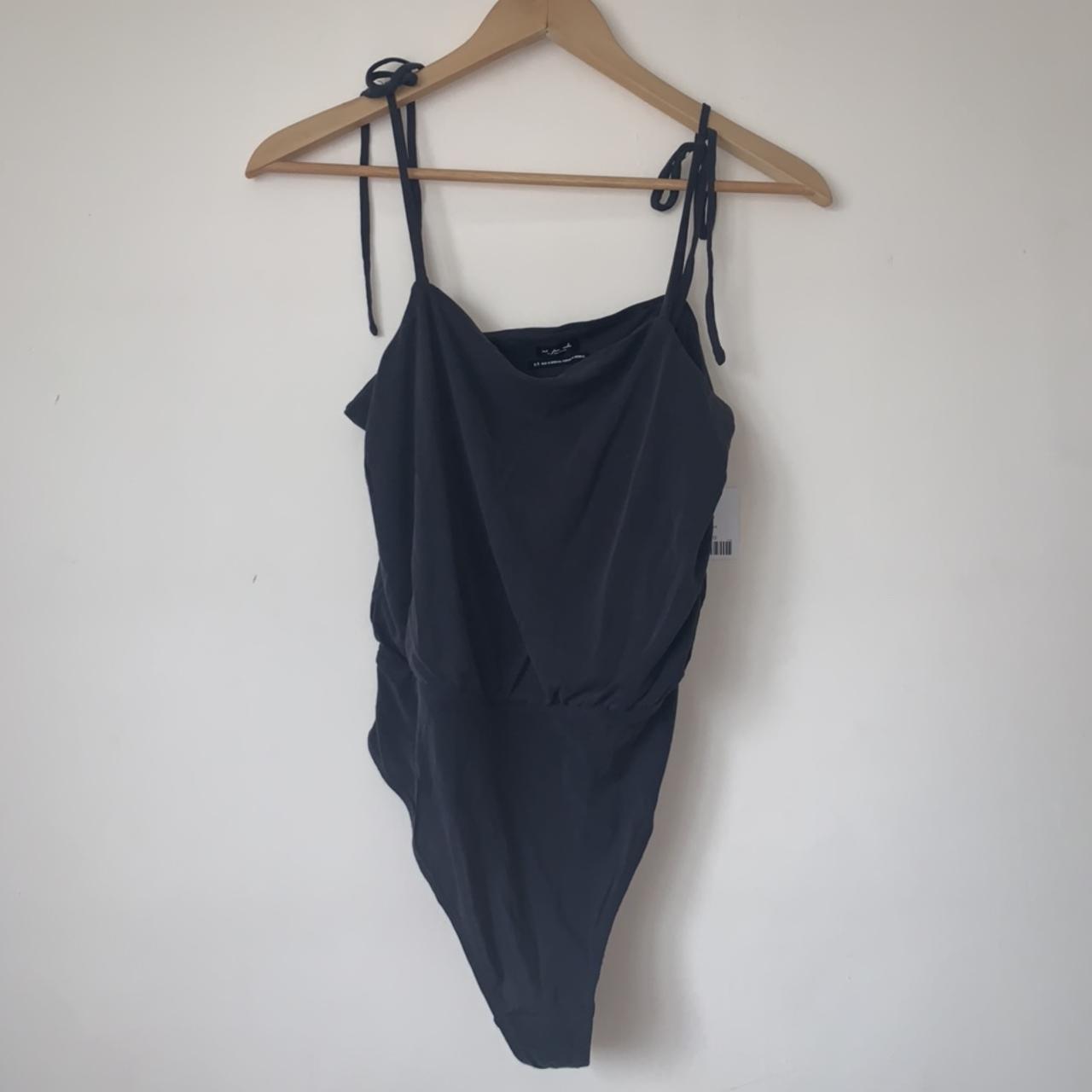 Urban Outfitters body suit. Stunning and tie up -... - Depop