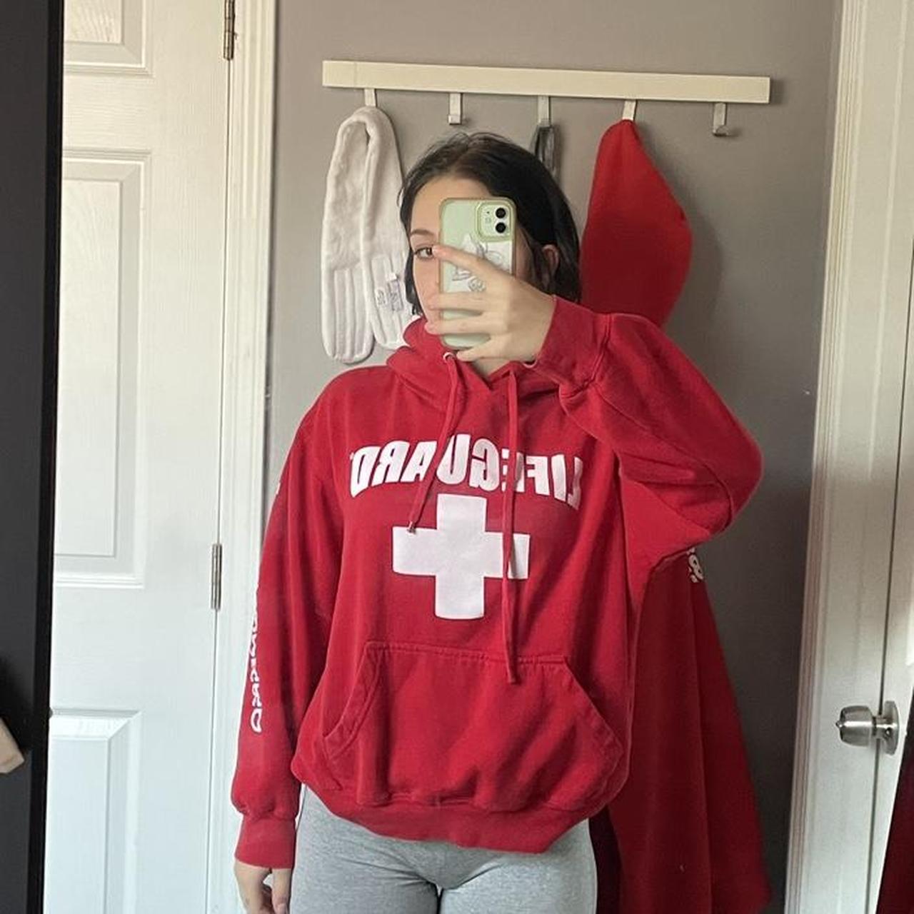 Lifeguard red hoodie, girls medium. Super flattering... - Depop