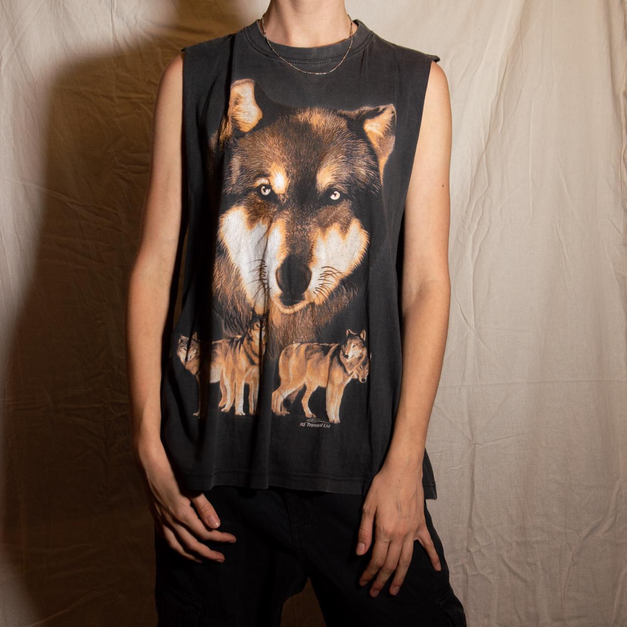SLEEVELESS WOLF TOP width (pit to pit) - 19... - Depop