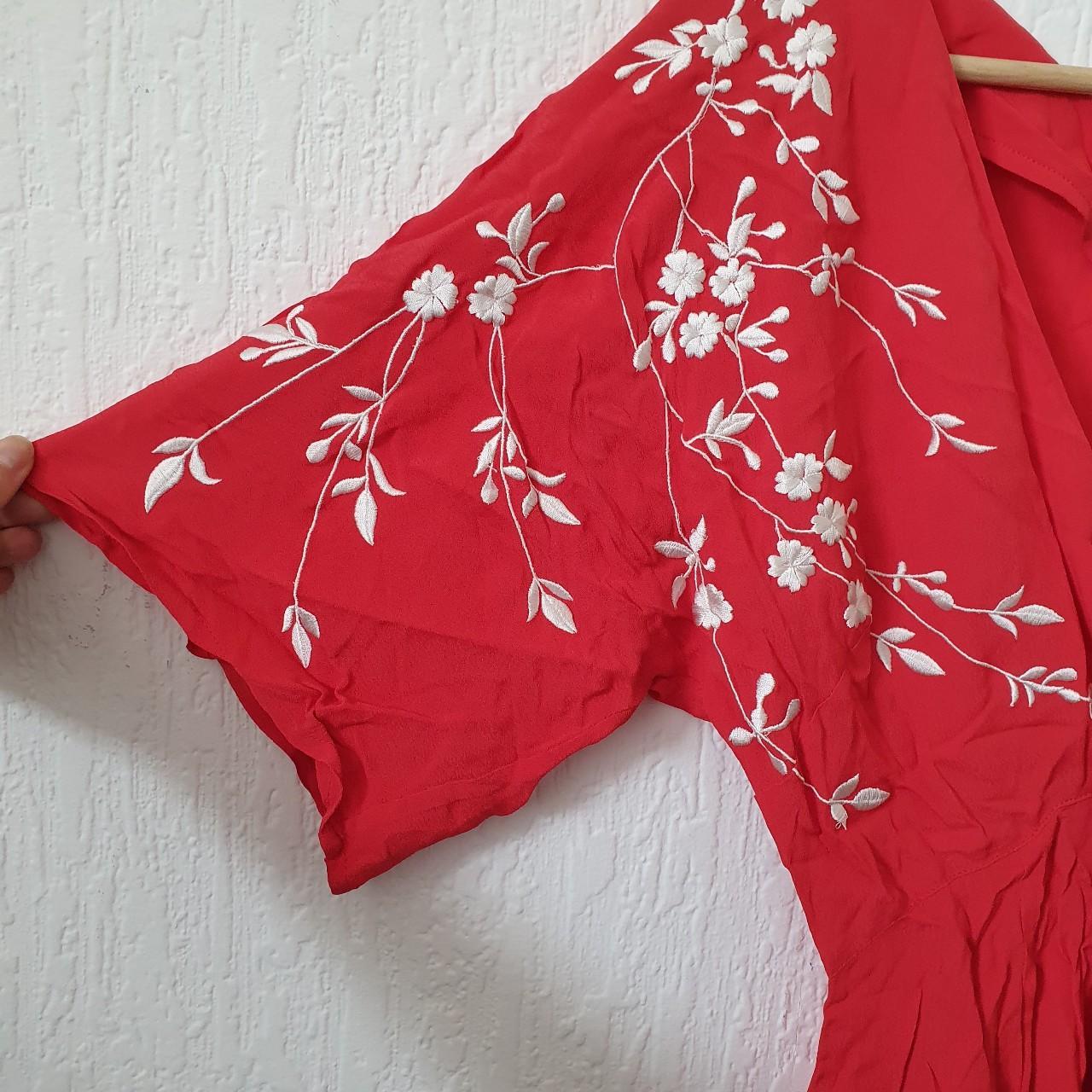 Red embroidered mini dress with wide sleeves and a v... - Depop