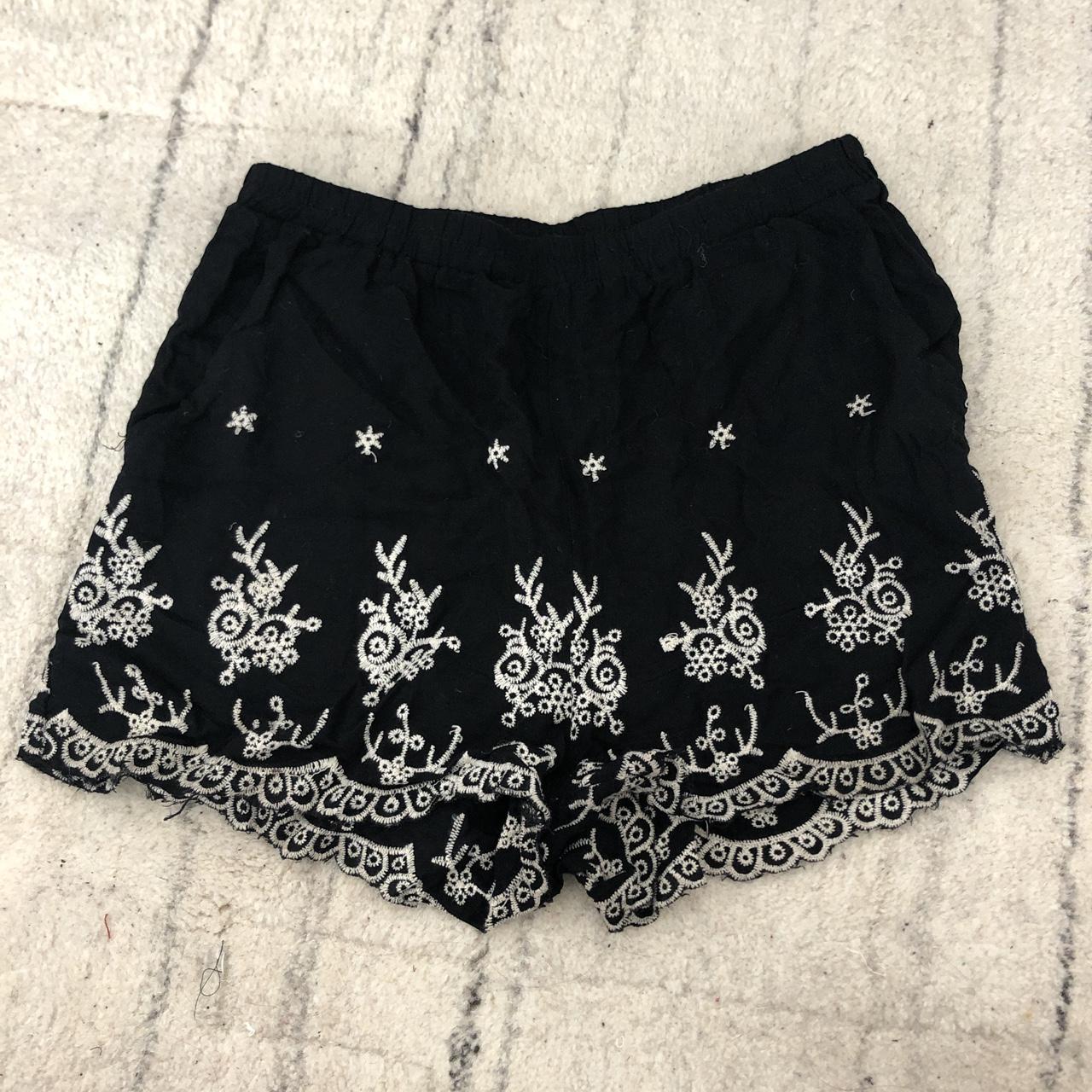 Black and white embroidered flowy shorts from... - Depop