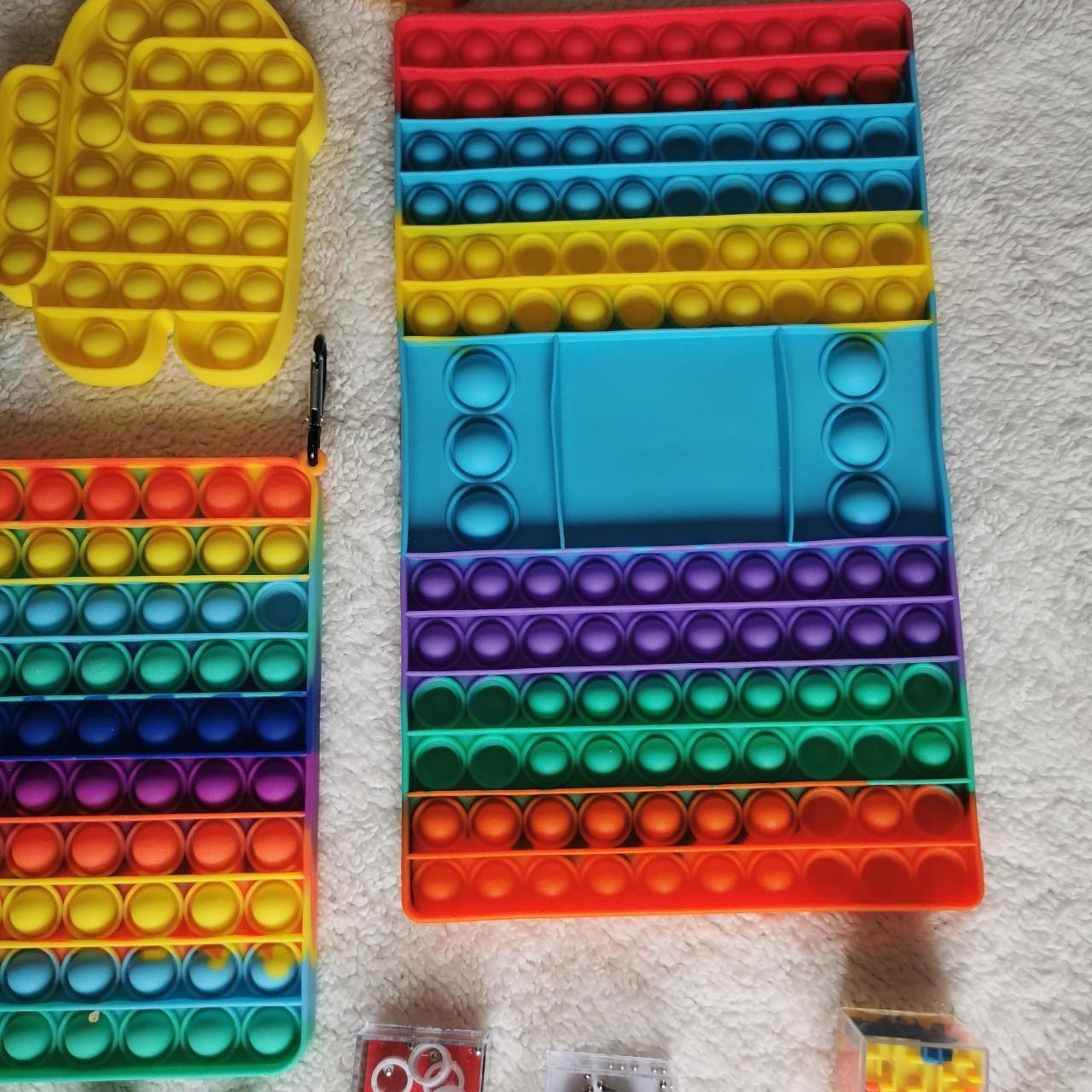Pop it toy bundle My daughter wishes to sell her... - Depop