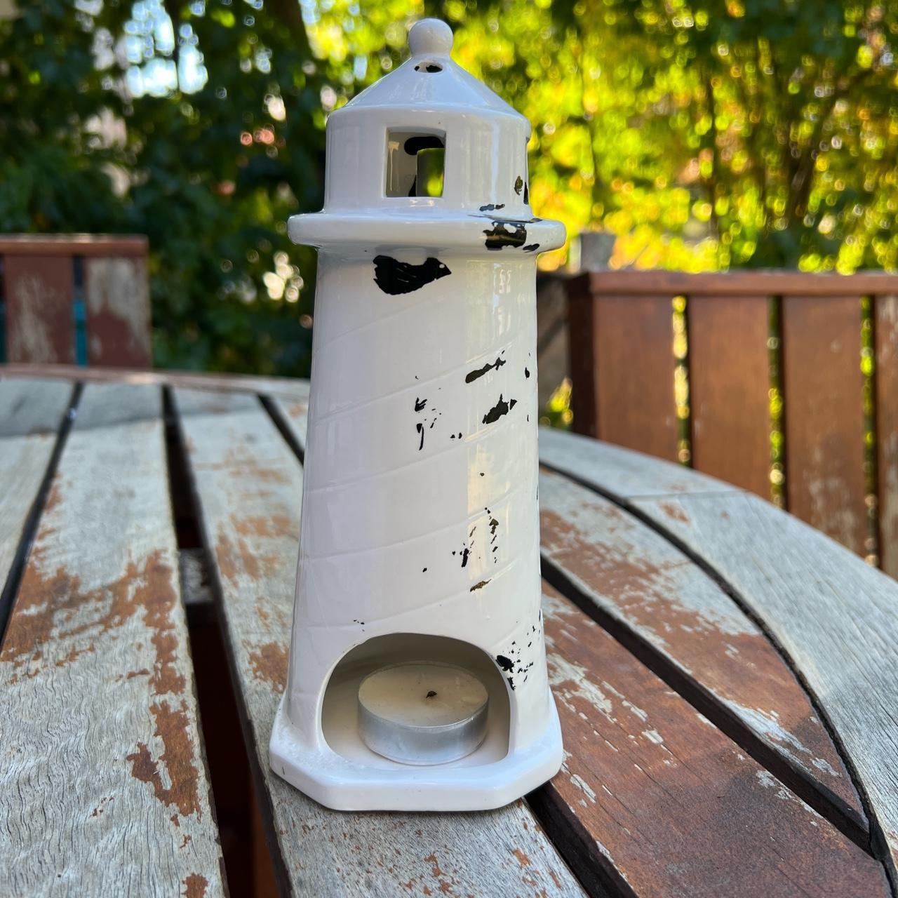 Lighthouse tea light holder Very fine fissure on... - Depop