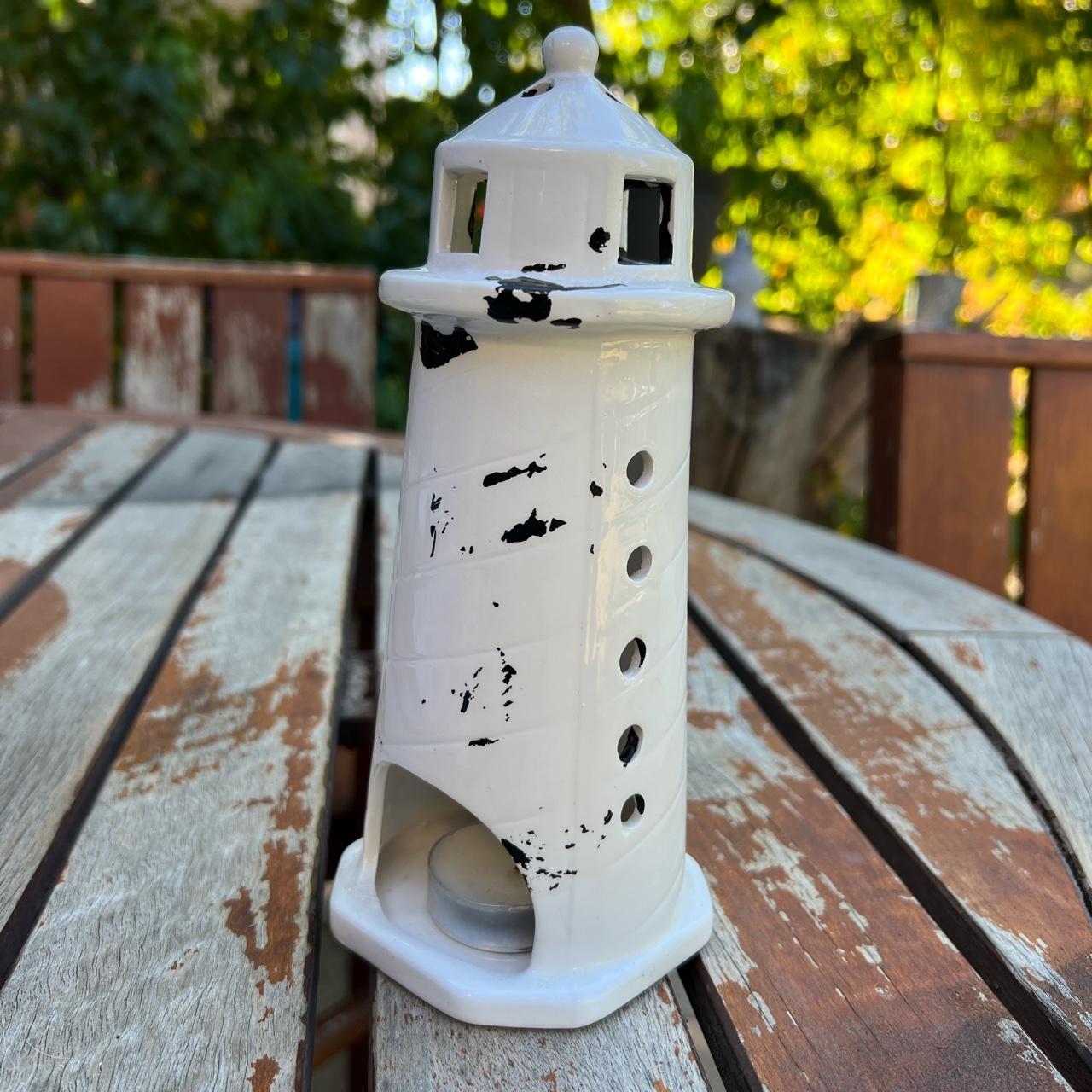 Lighthouse tea light holder Very fine fissure on... - Depop