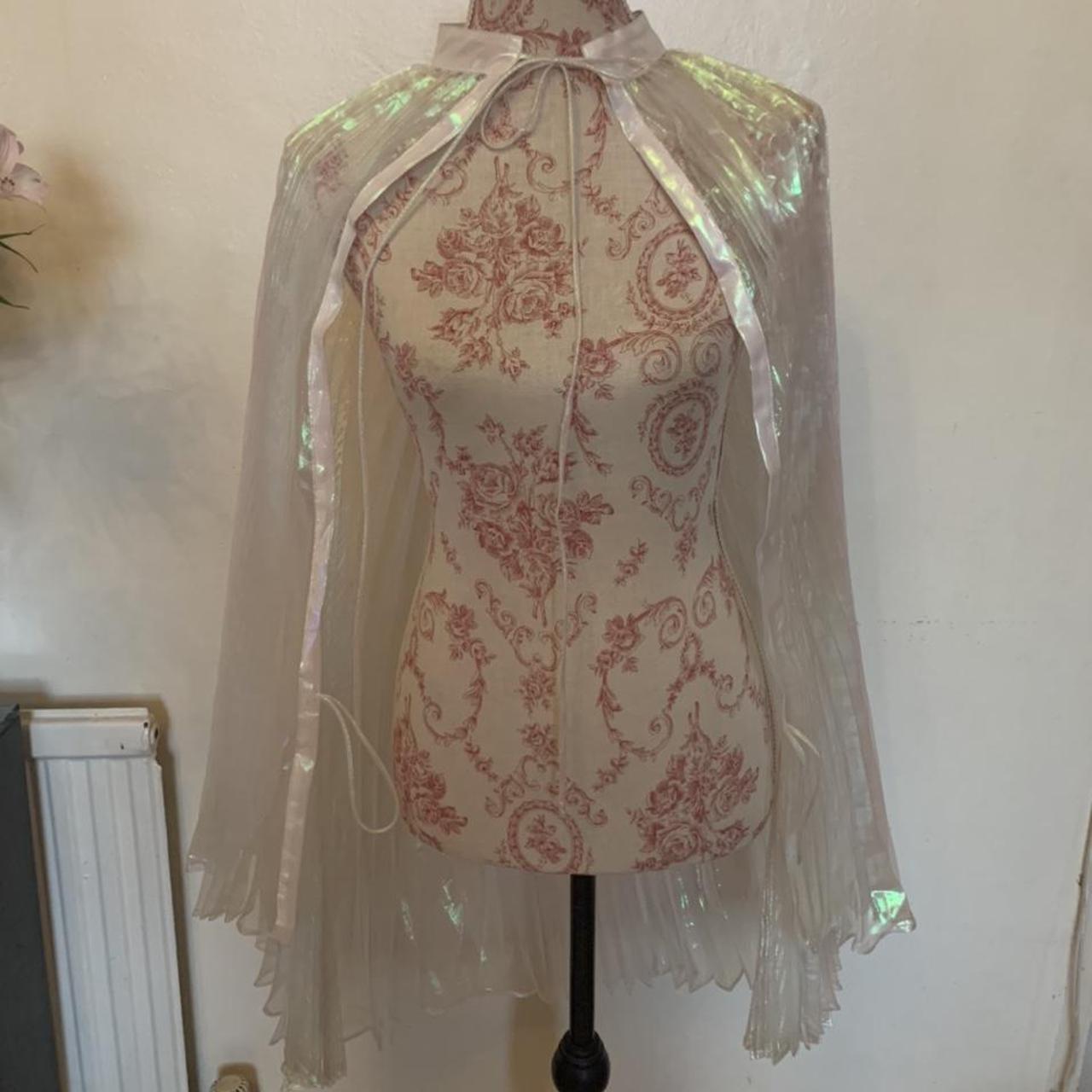 Translucent iridescent cape. Size S/M It attached... - Depop