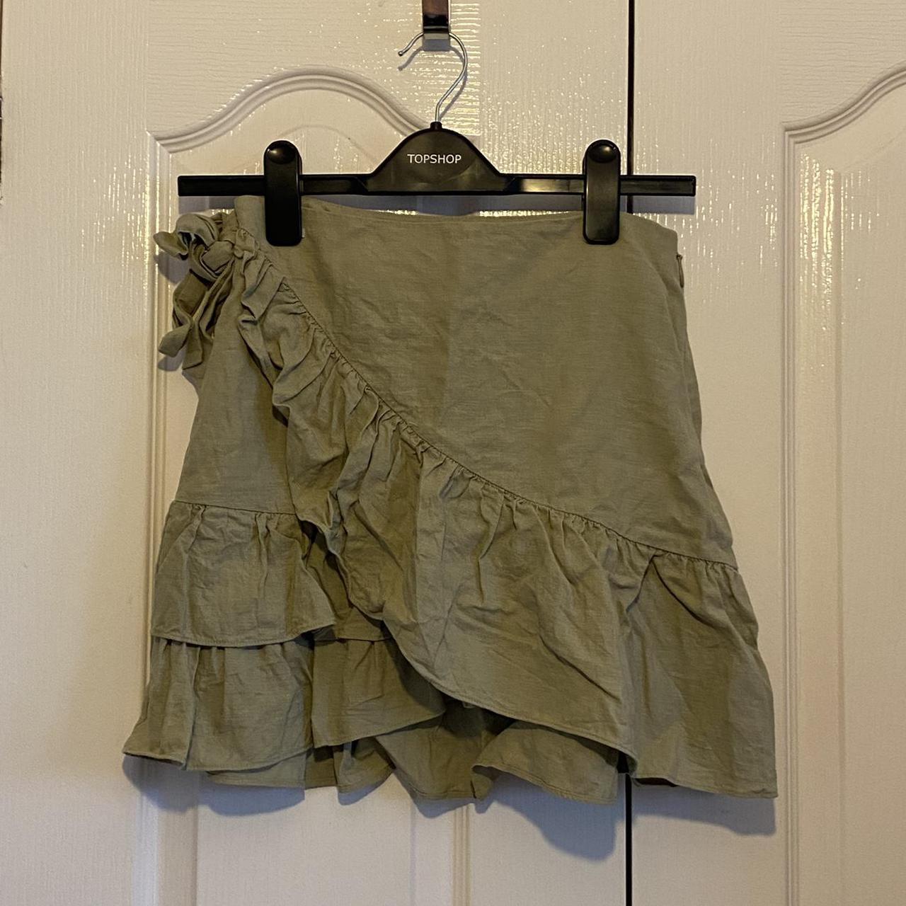 khaki/beige ruffle mini skirt with tie at side -... - Depop
