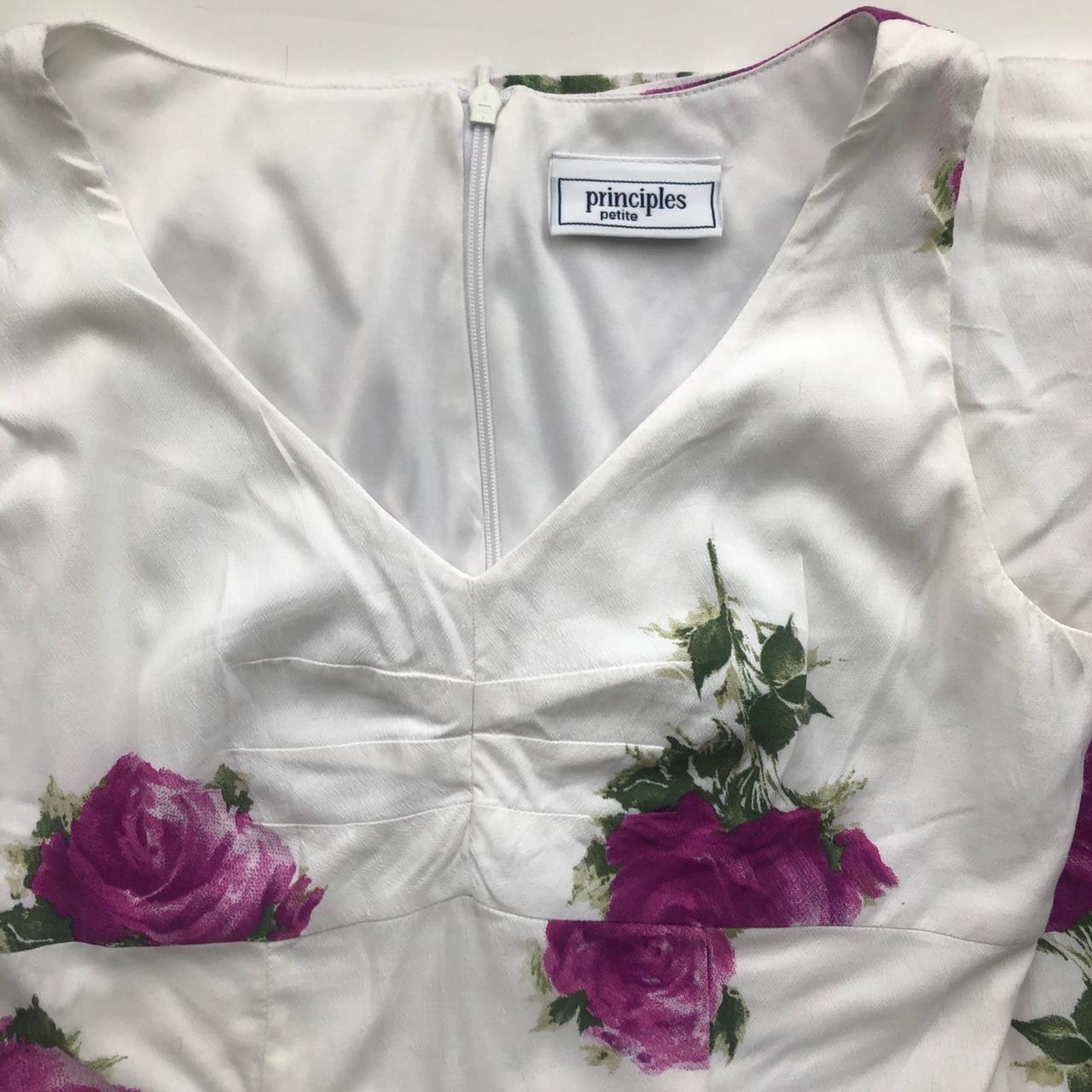 Vintage white dress with purple floral details from... - Depop