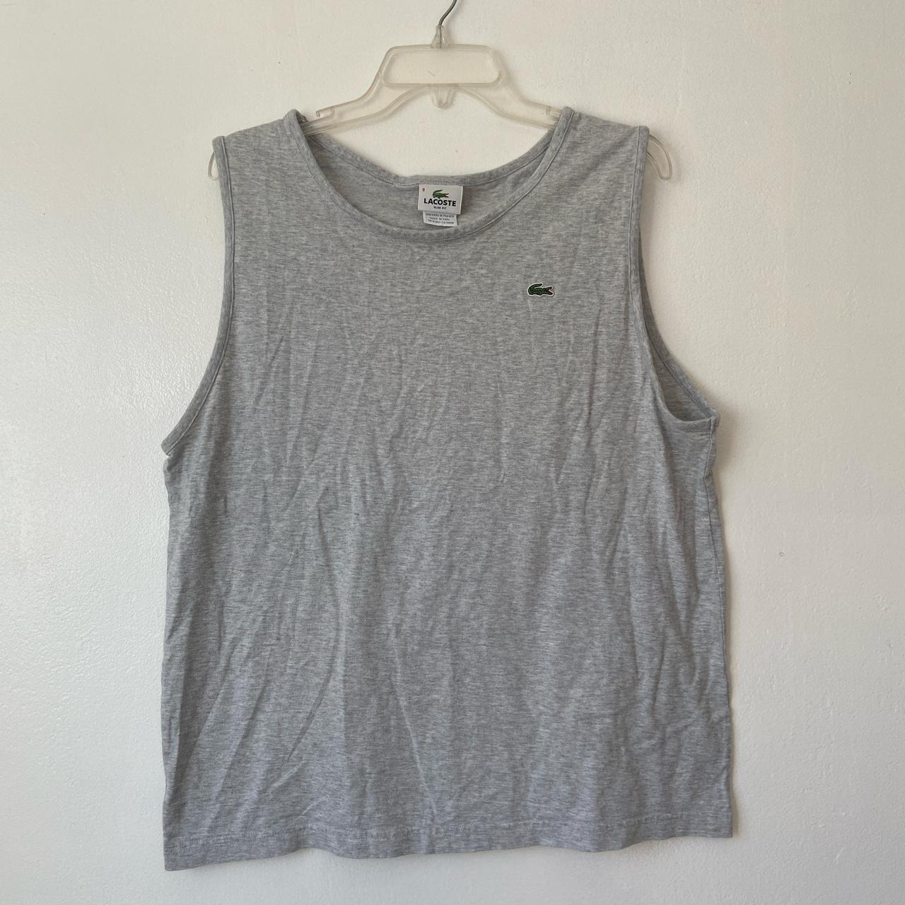 Grey Lacoste tank top. Marked size 8. - Depop