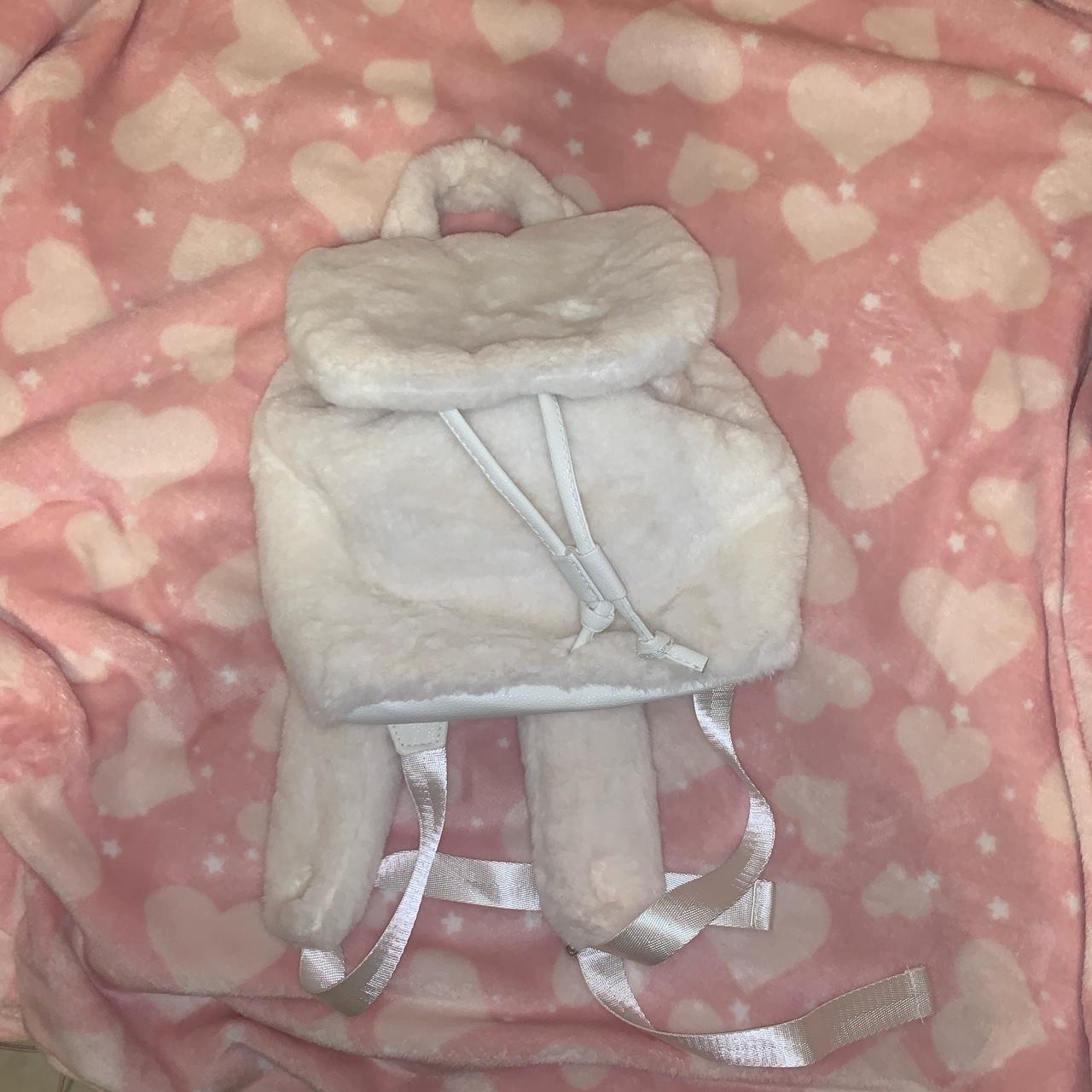 super cute fur white mini backpack never used it... - Depop