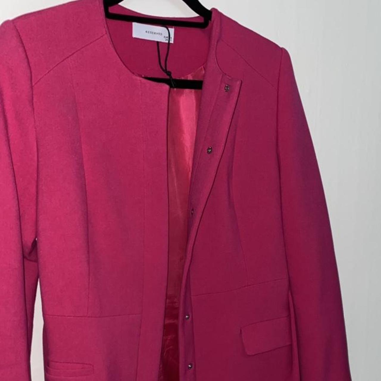 A beautiful hot pink mid length jacket. Zip up with... - Depop