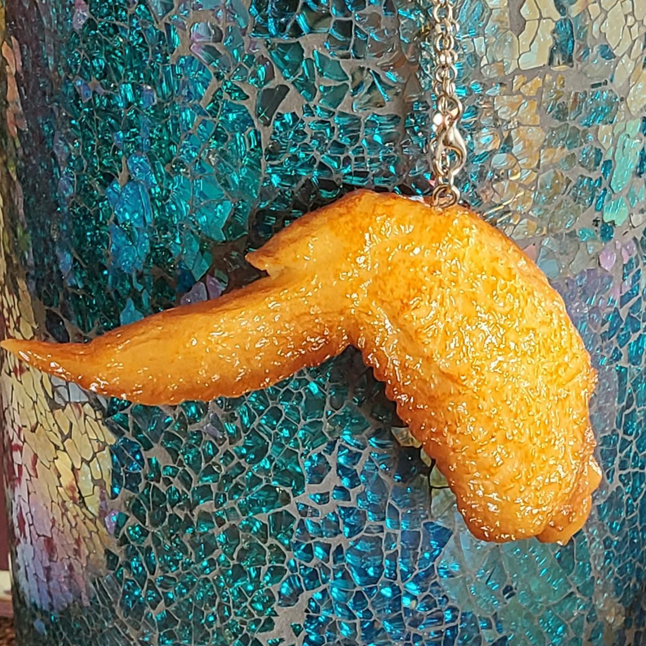 Chicken wing necklace with one sturdy chain... - Depop