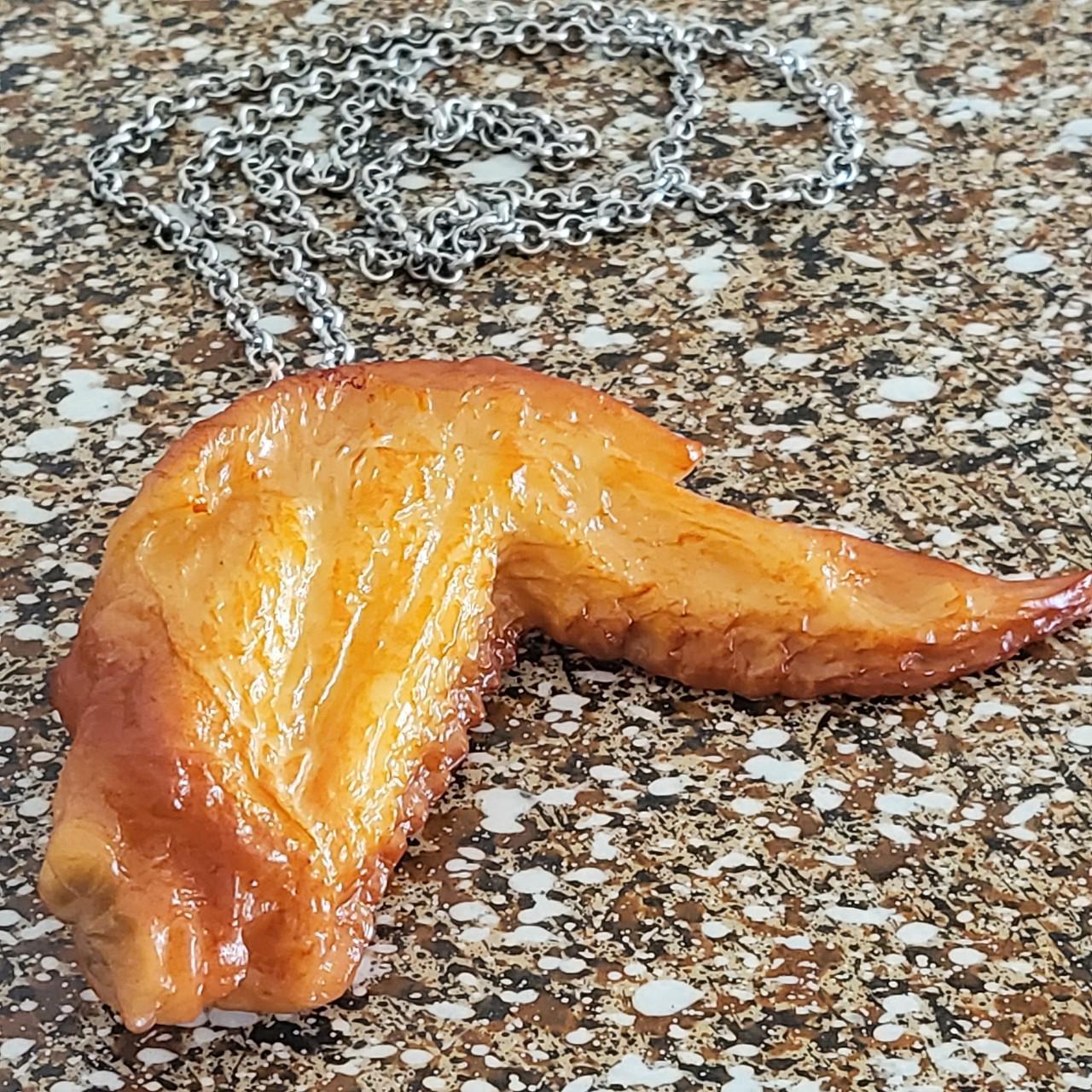 Chicken wing necklace with one sturdy chain... - Depop