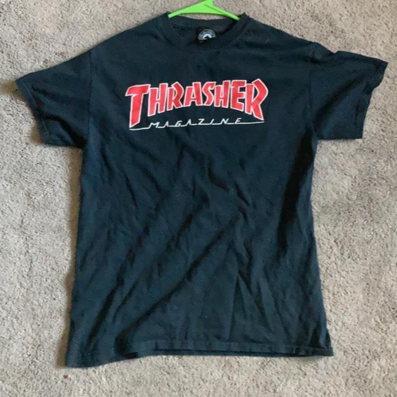 thrasher tshirt, tag says medium but fits like... - Depop