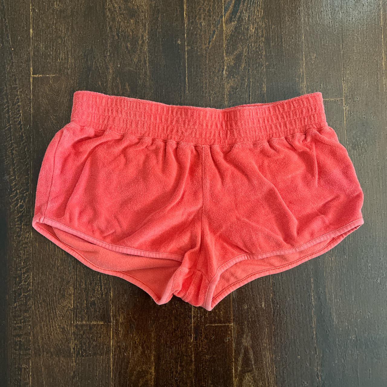 Small orange terry cloth shorts, could be worn to... - Depop