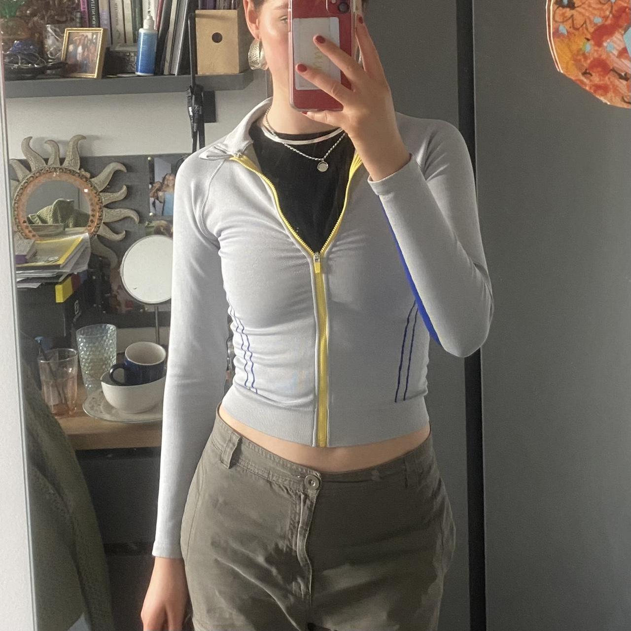 Zip up athletic jacket Fabletics grey yellow and... - Depop