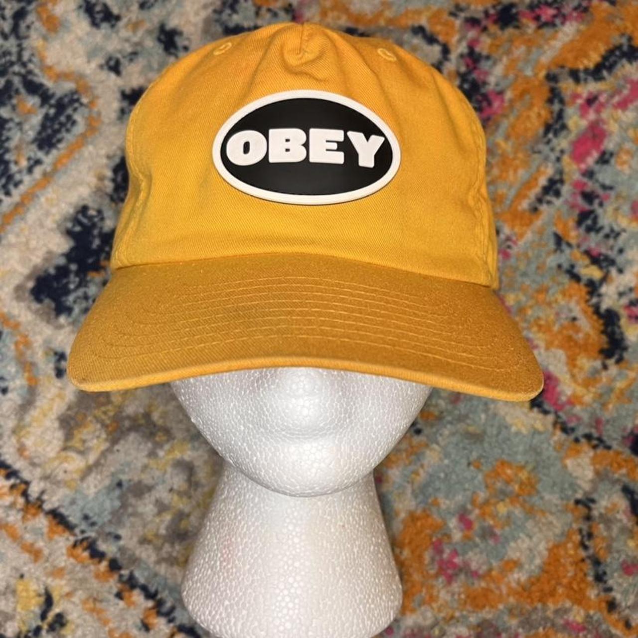 Yellow Obey cap, rubber Obey patch. discoloration... - Depop
