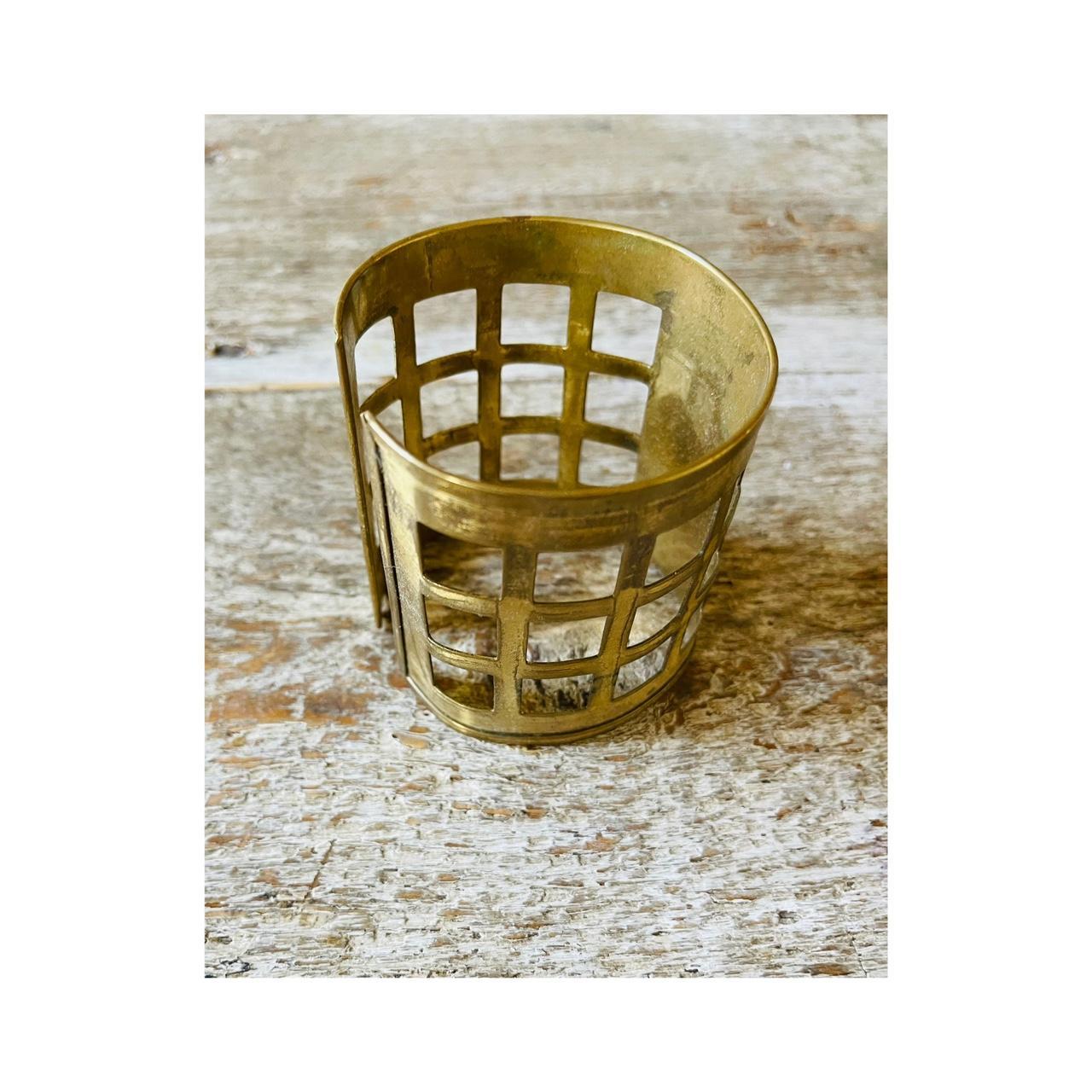 Gold hand cuff. You can see the the signs of wear... - Depop