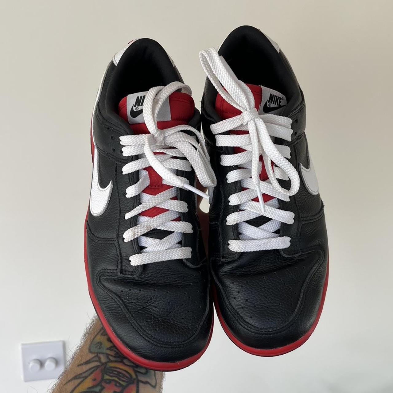 Nike Men's Black and Red Trainers | Depop