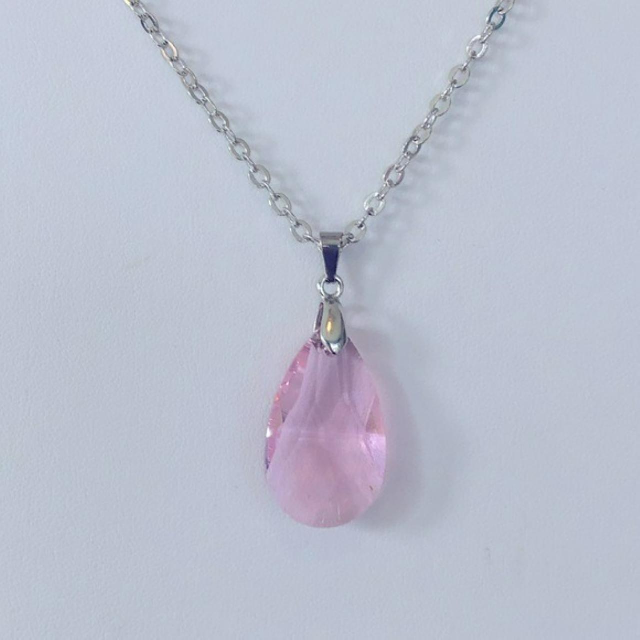 Pretty Pink crystal on a 22” stainless steel chain... - Depop