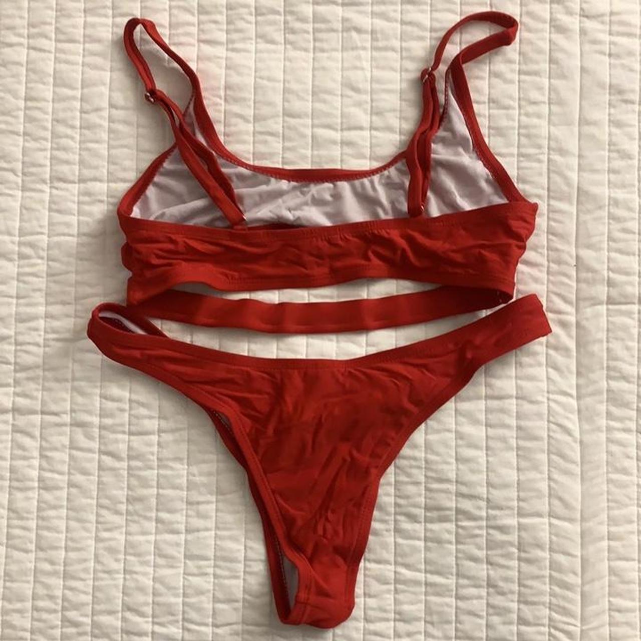 Cut-out red bikini Top worn once, bottoms never... - Depop