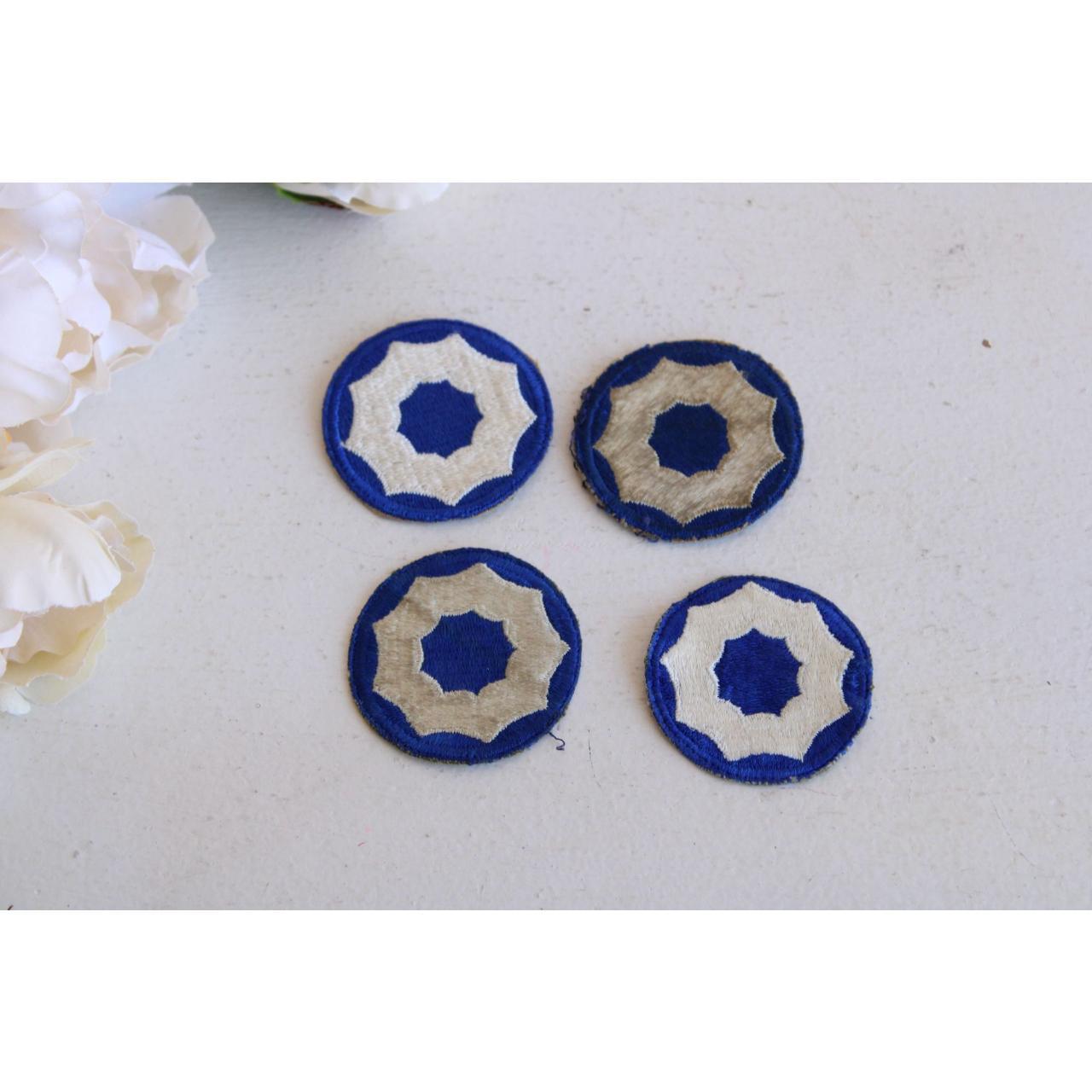 Military patch in blue with white shape in the... - Depop