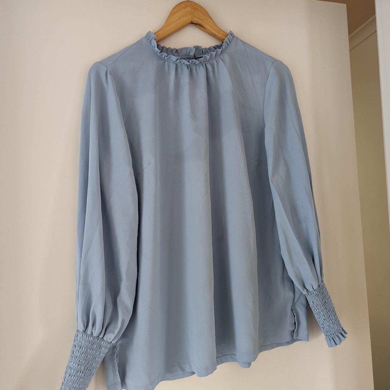 Preview. Light blue blouse with frill neck. Worn... - Depop