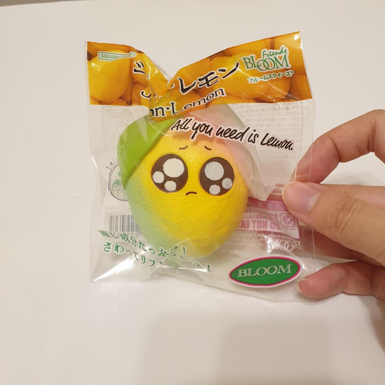 John Lemon squishy Rainbow lemon squishy, with a... - Depop