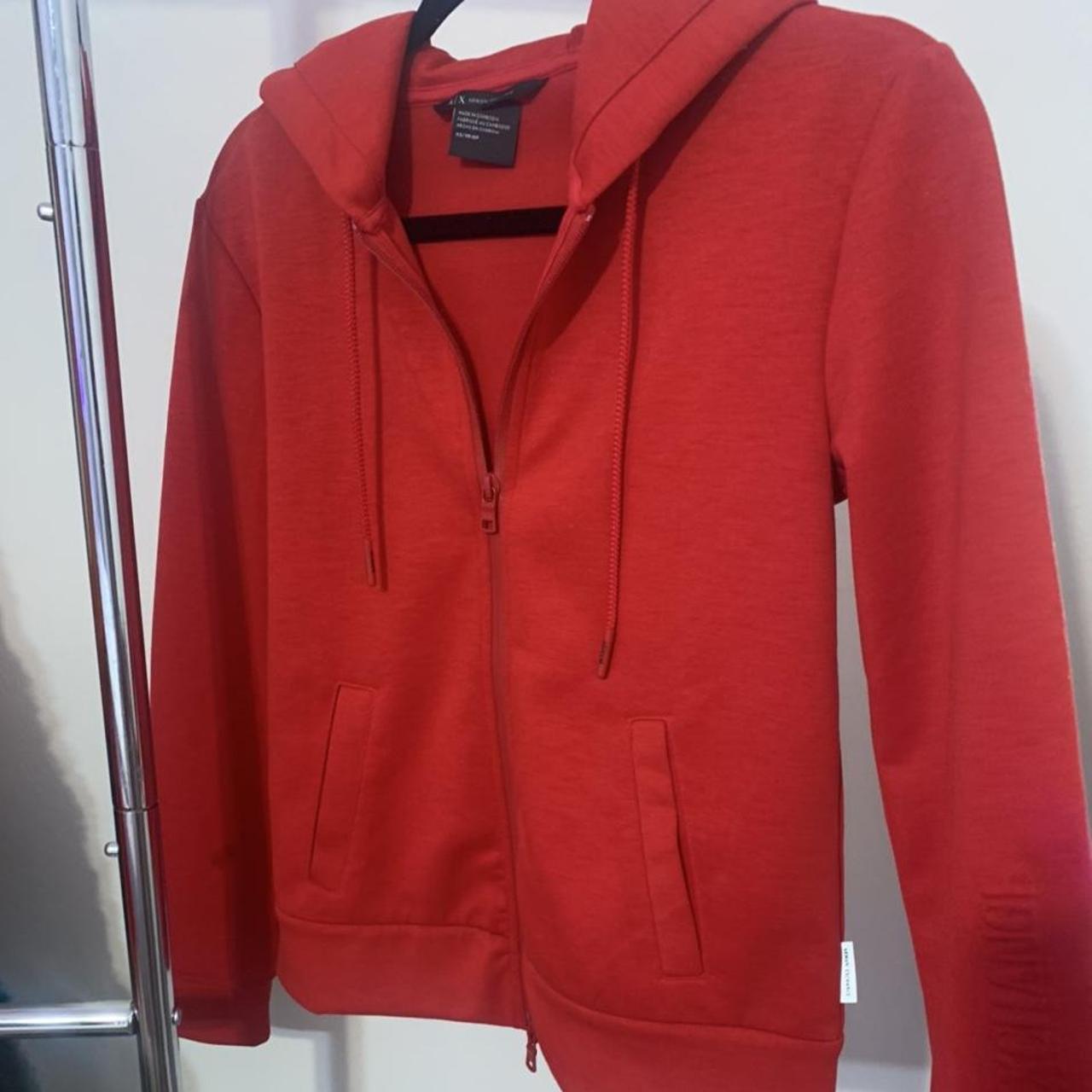 Armani Exchange Red Zip up with hood NEVER WORN... - Depop