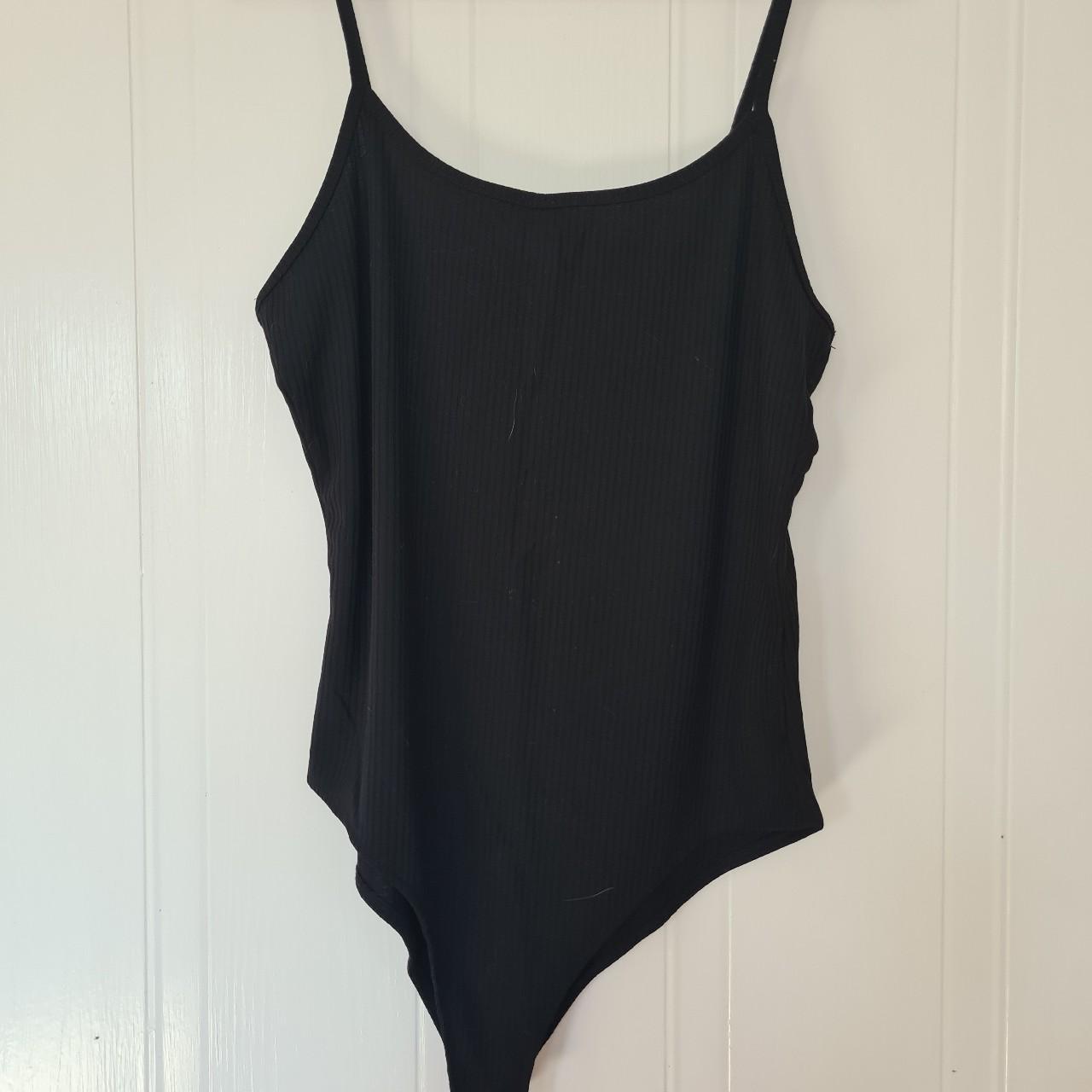 Black ribbed bodysuit from Primark. Worn once (over... - Depop