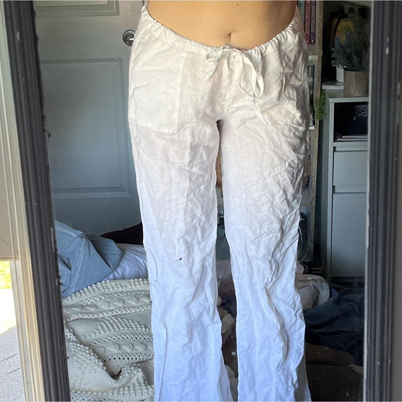 low rise white pants size: 9 but they have a tie... - Depop