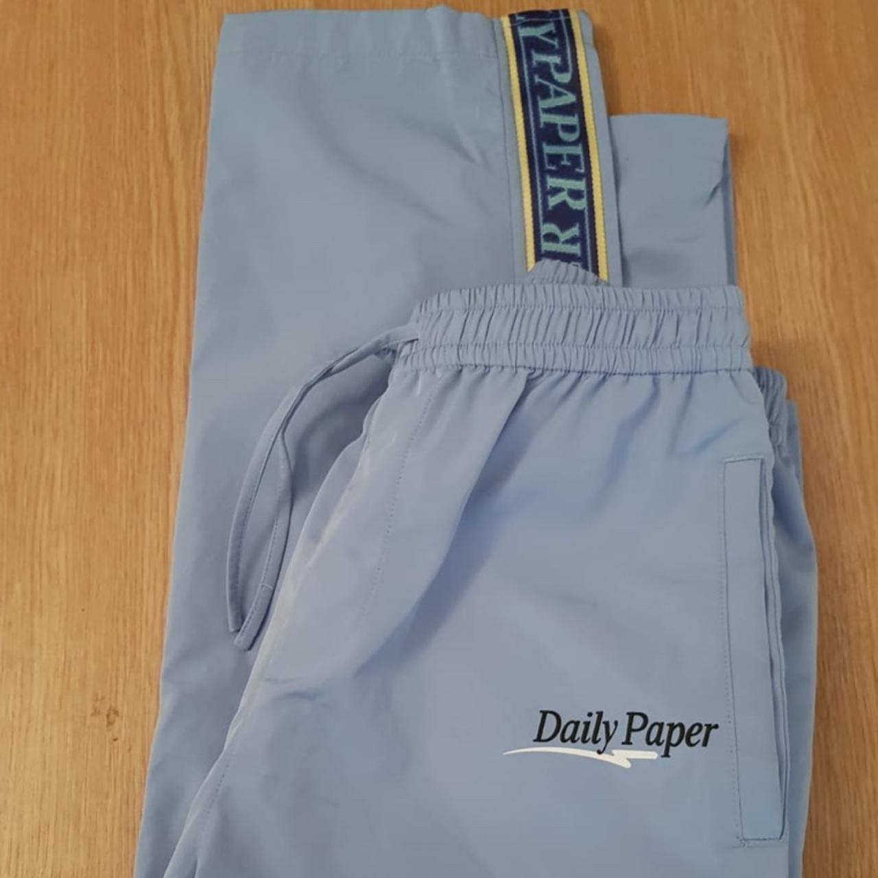 Baby blue daily paper popper tracksuit bottoms, with... - Depop
