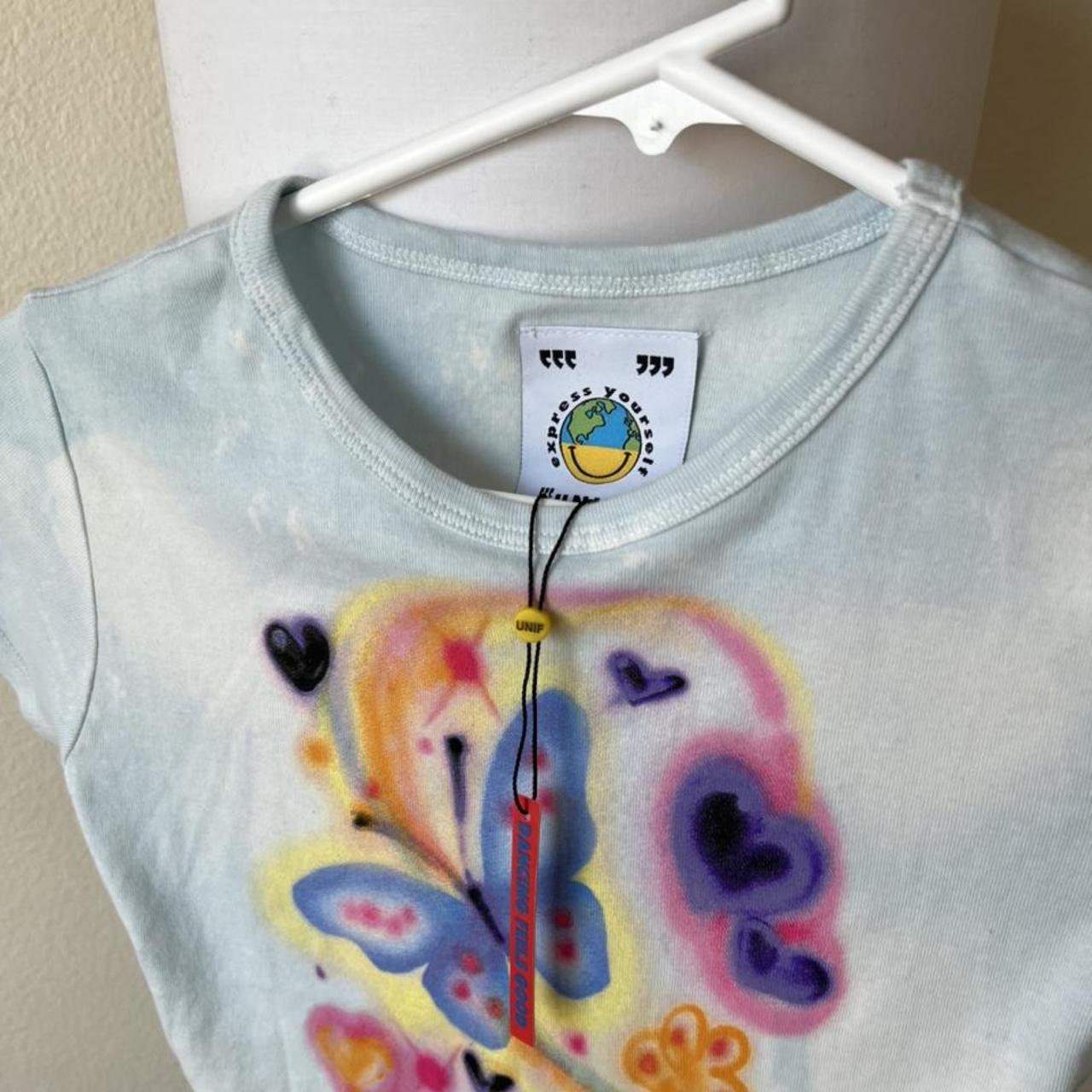 UNIF blue t-shirt with butterfly - Depop