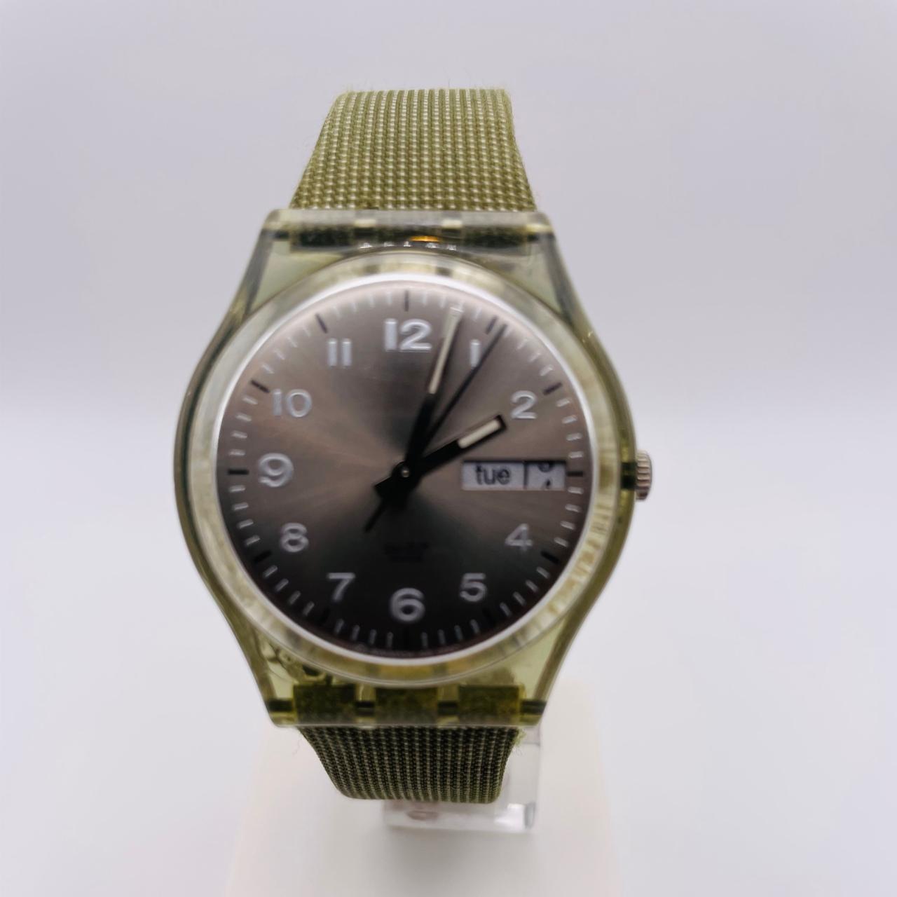Swatch Men's Khaki Watch | Depop
