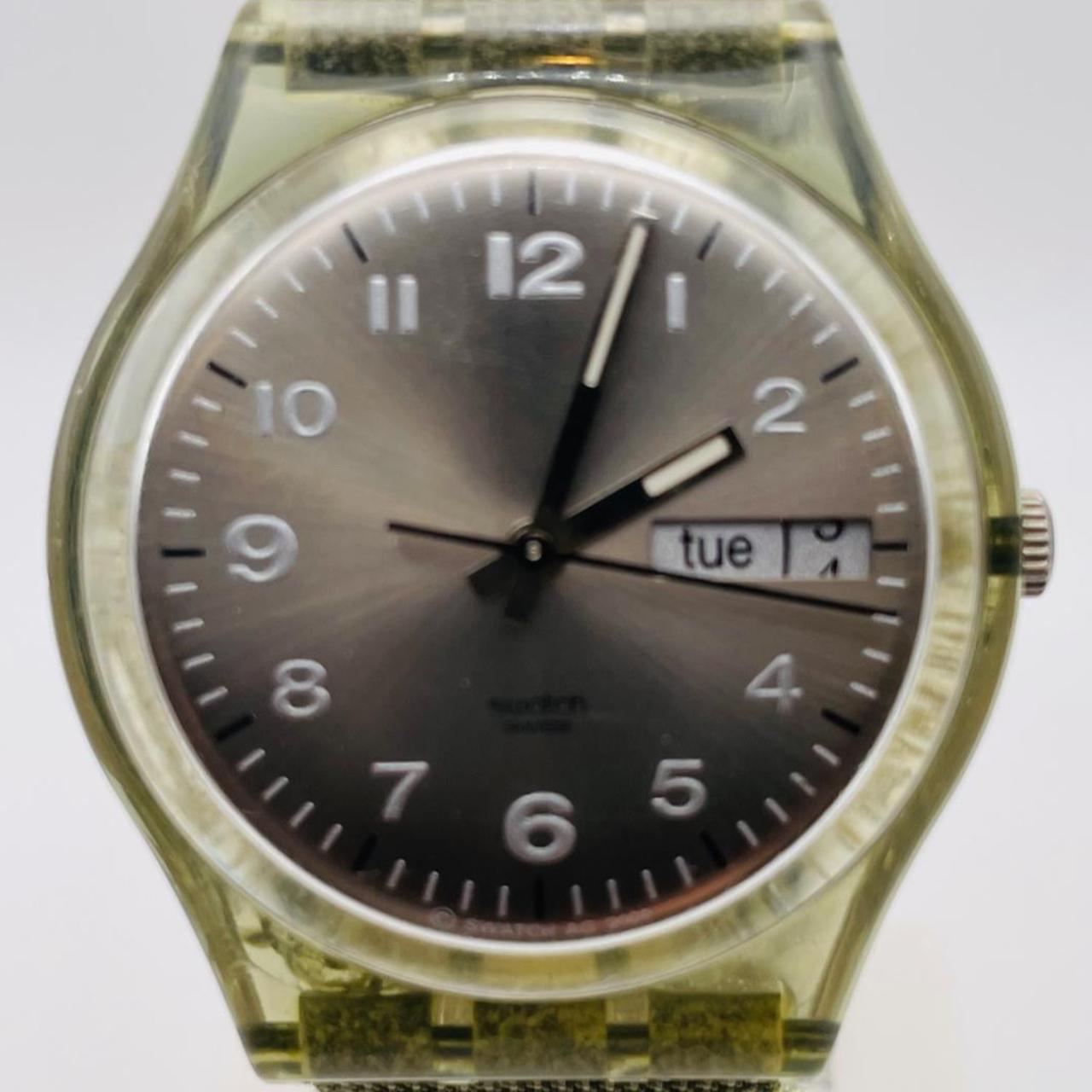 Swatch Men's Khaki Watch | Depop