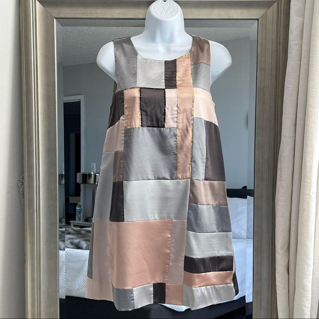 Loose swing shape for an easy, flowy fit. Copper... - Depop