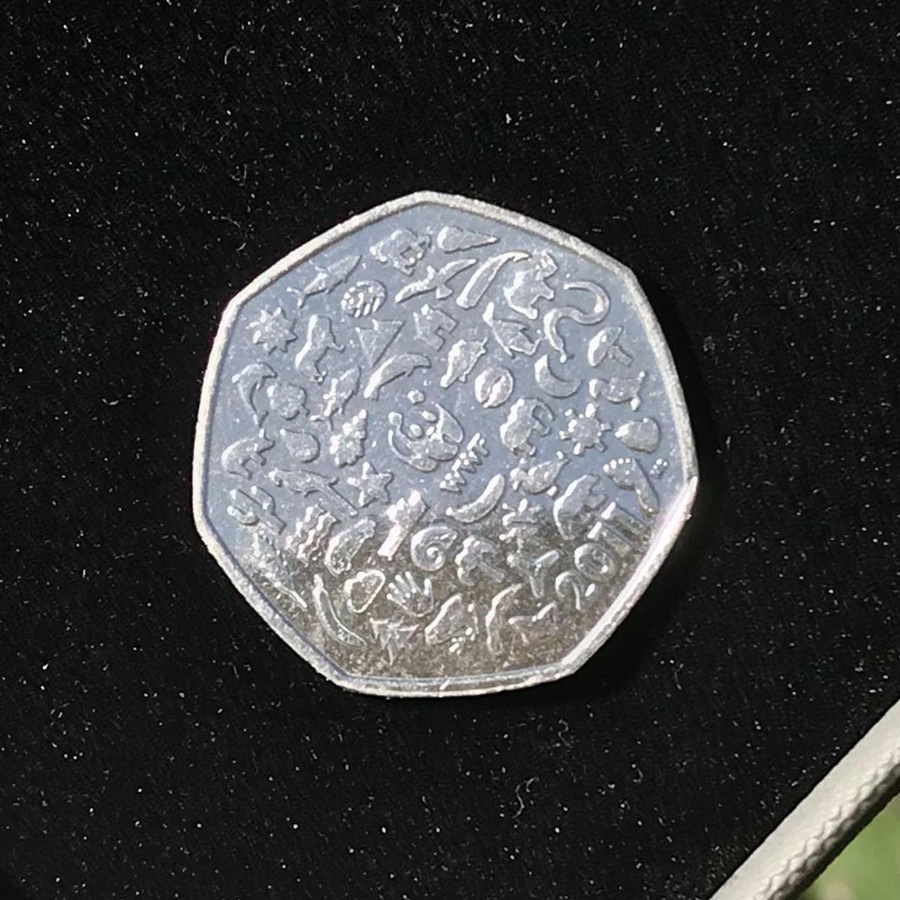 RARE WWF 50p Minted in 2011 to celebrate the 50th... - Depop