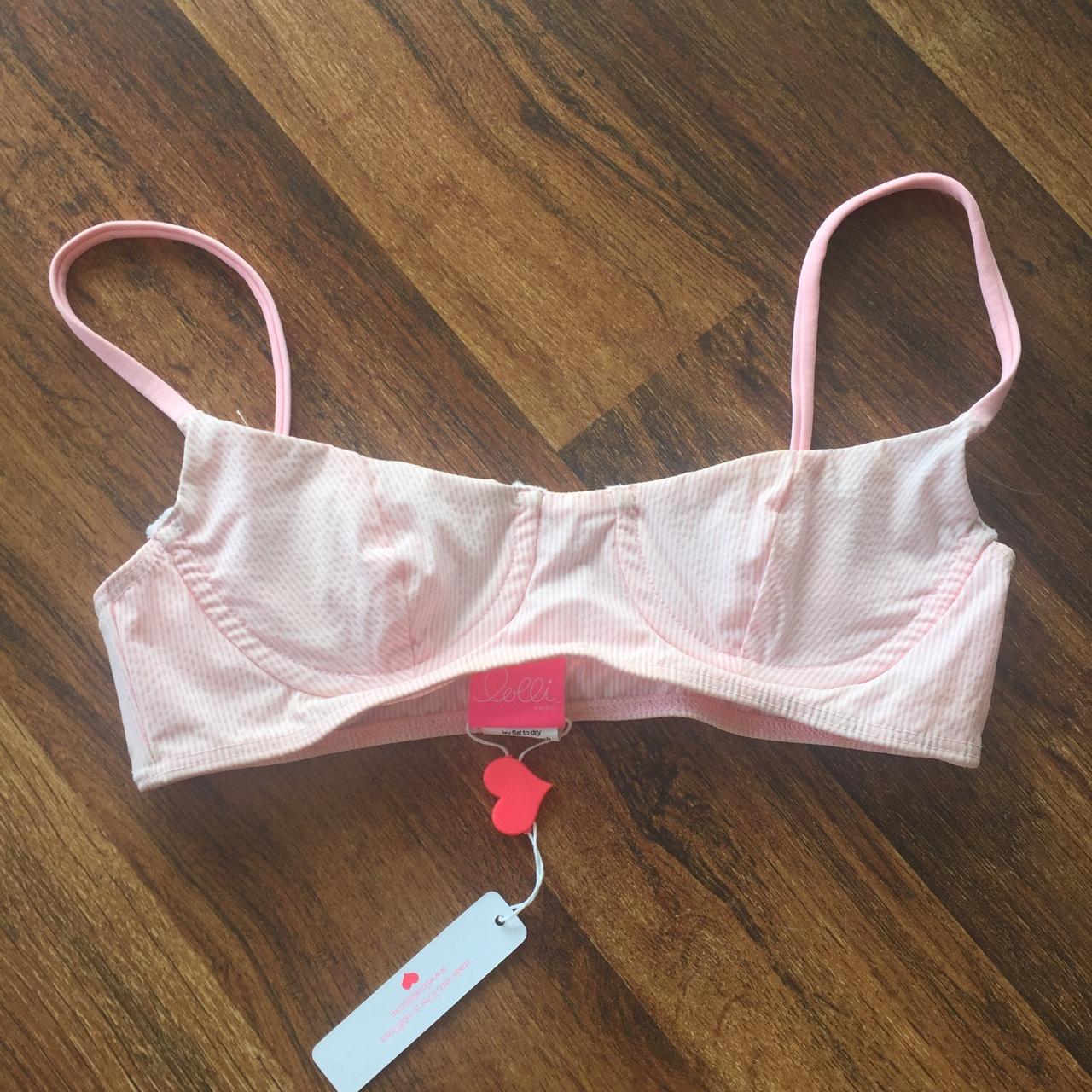 Lolli top. Brand new. Has a bit of a yellowish color... - Depop