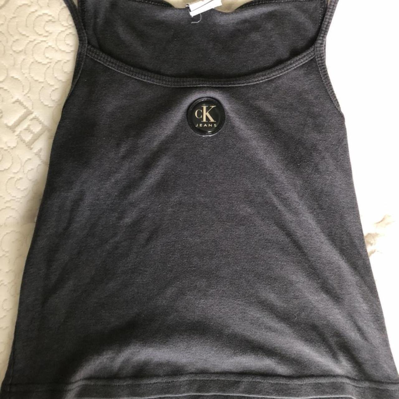 Black Calvin Klein tank top ~Logo on front ~Size... | Depop