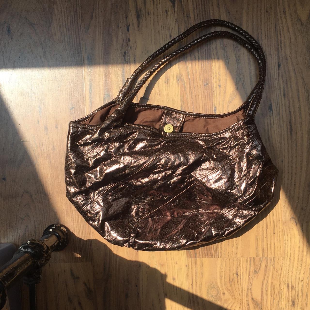 Brownie / bronze metallic handbag. Never been used... - Depop