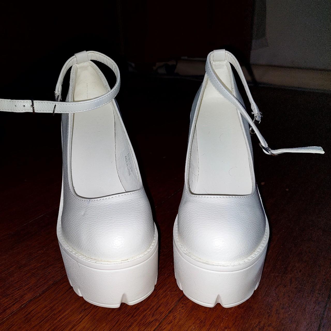 White heeled shoes too big for me to wear but are a... - Depop