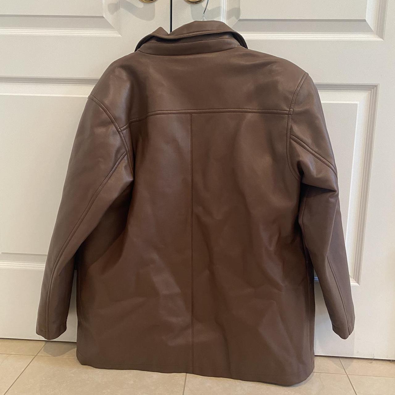 Brown pleather oversized jacket. Has lining inside,... - Depop