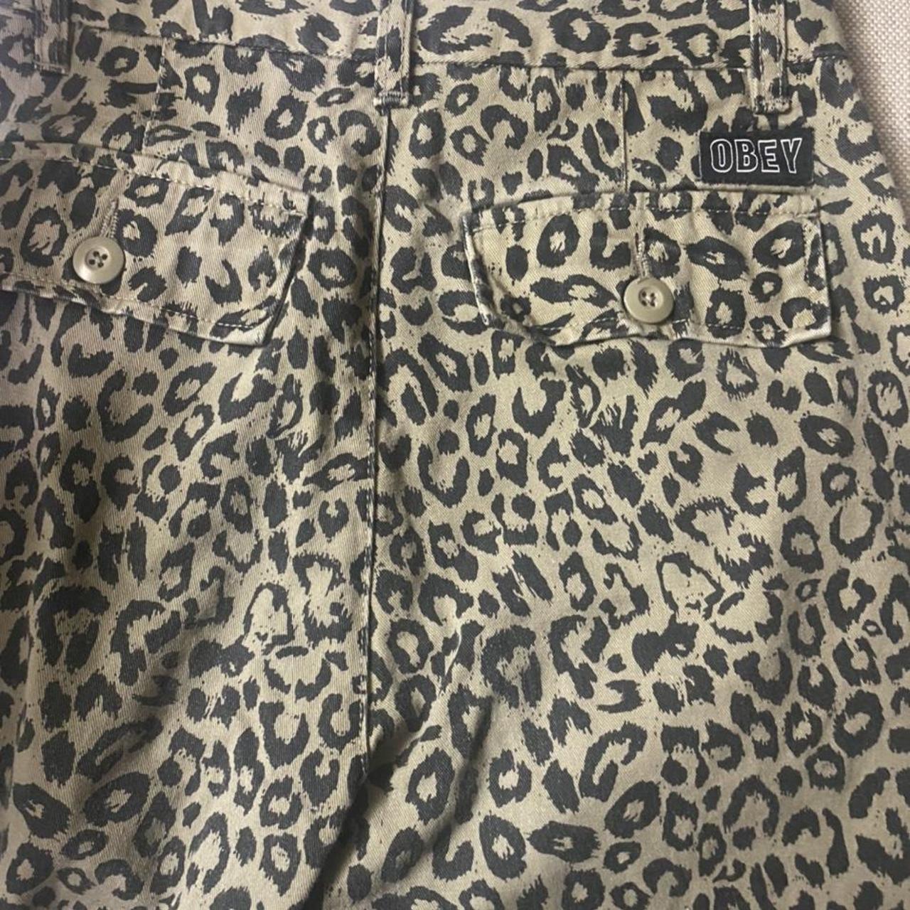 barely worn, cheetah obey pants, they are flare... - Depop